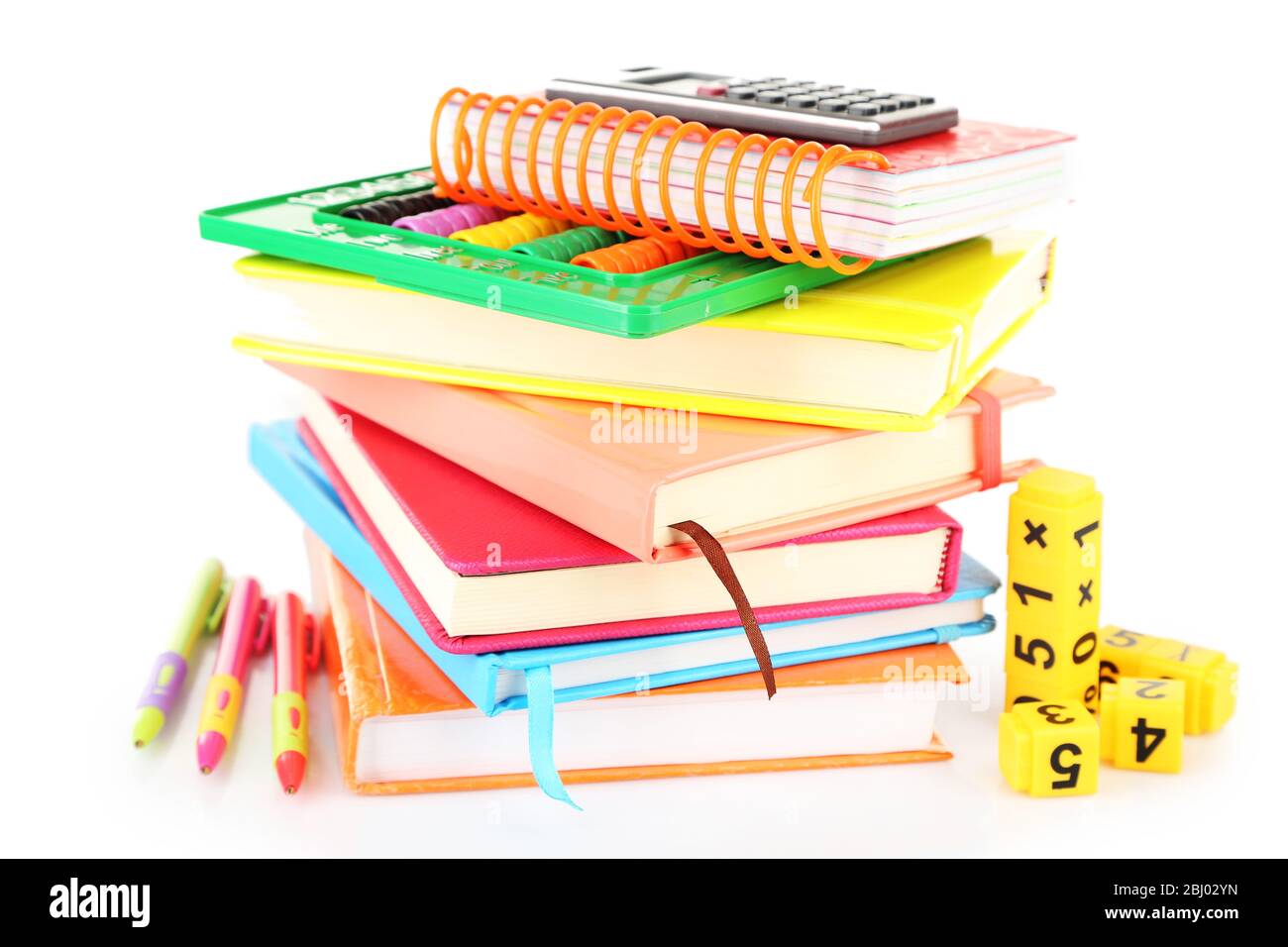 Stack of books and stationery isolated on white Stock Photo - Alamy