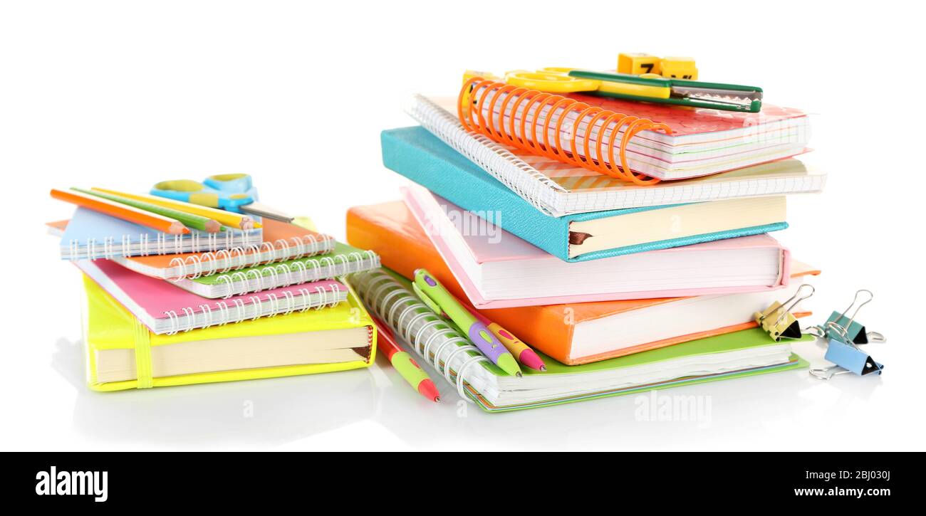 Stack of books and stationery isolated on white Stock Photo - Alamy