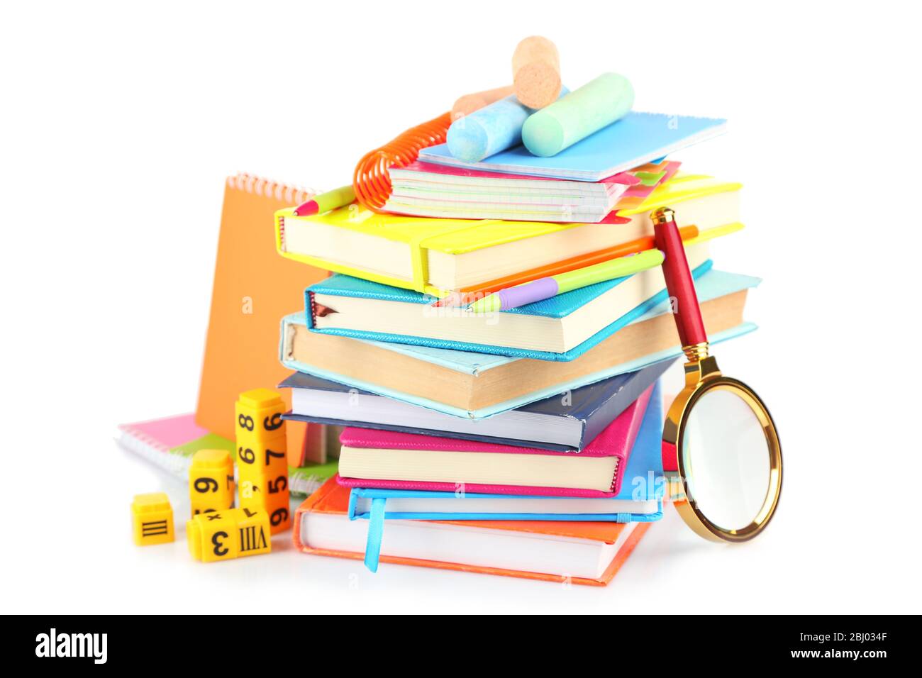 Stack of books and stationery isolated on white Stock Photo - Alamy
