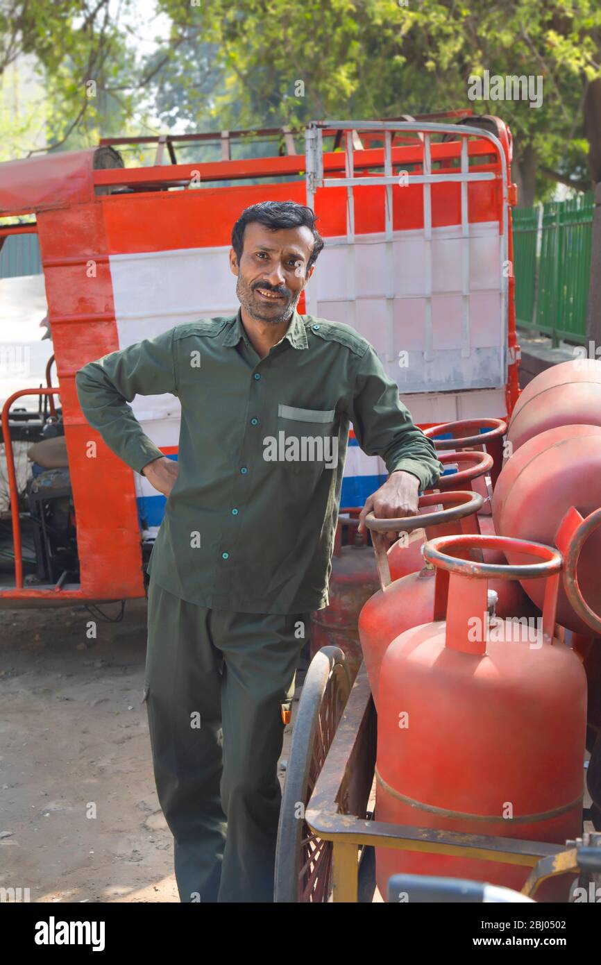 Man with Gas Cylinders Stock Photo - Alamy