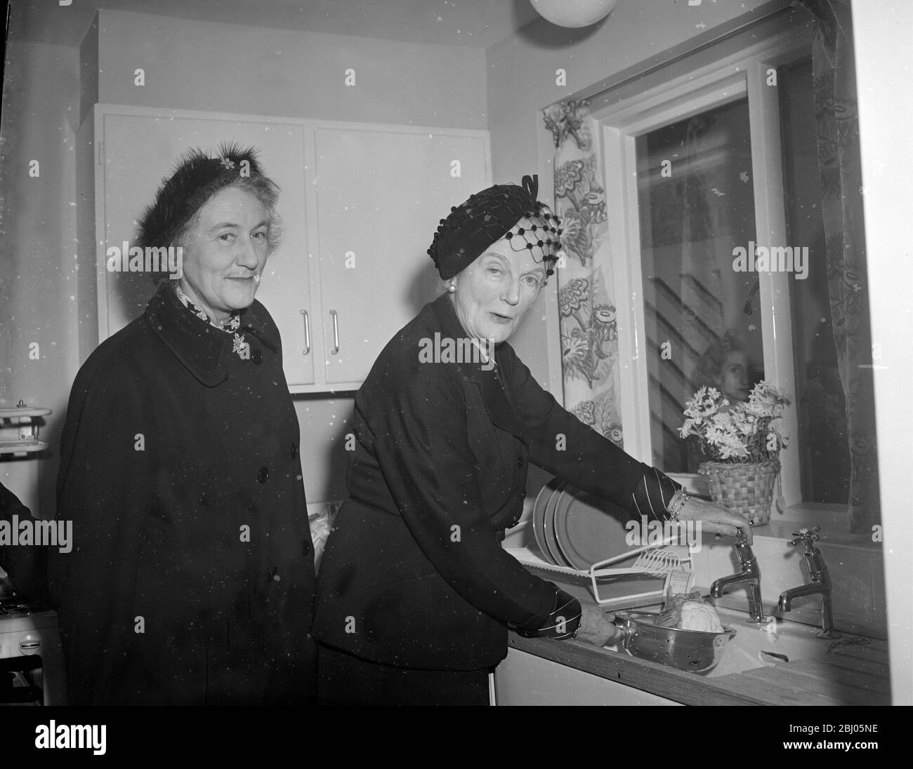 Mrs Winston Churchill, wife of the Prime Minister does a bit of washing ...