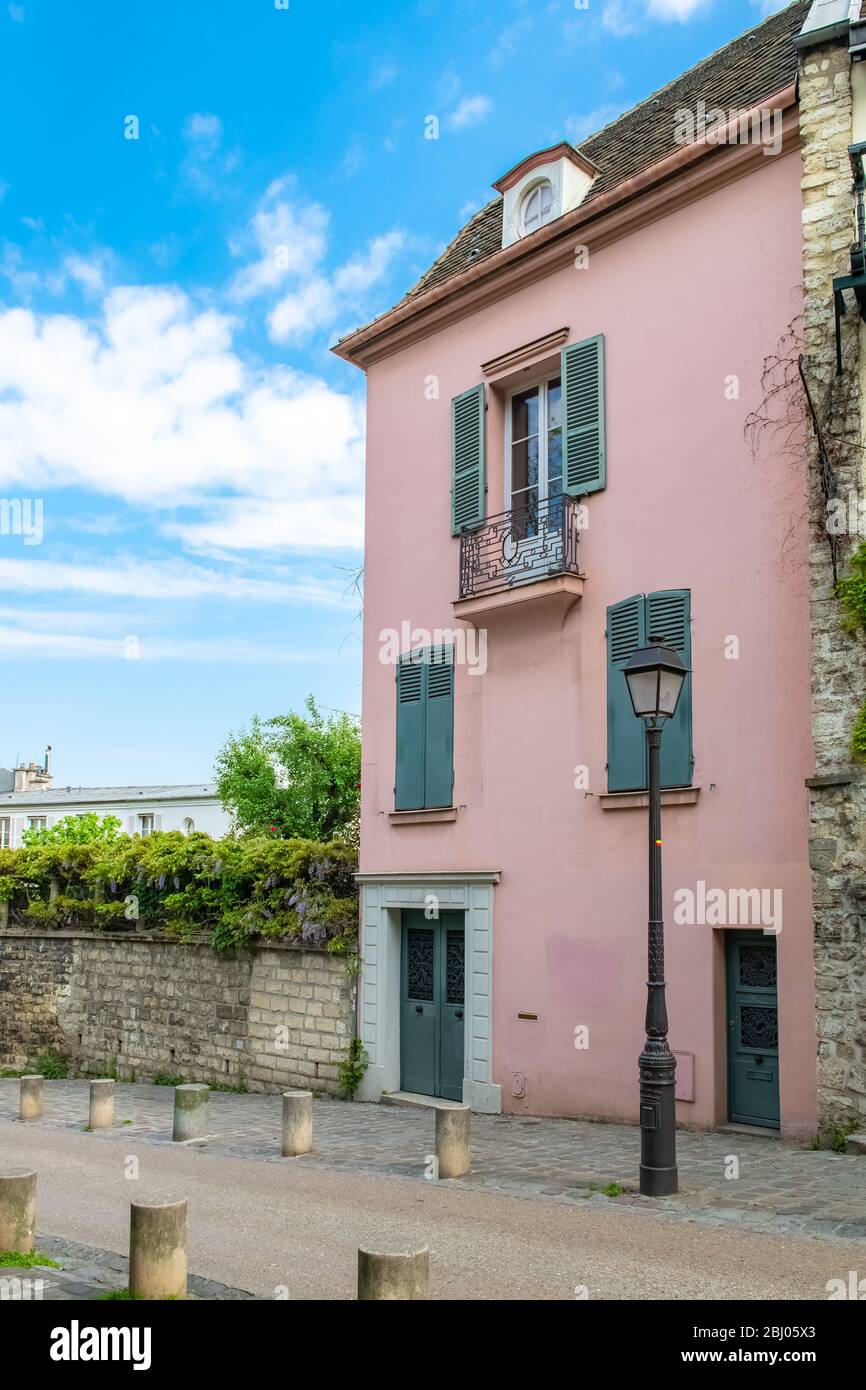 Paris, France, famous pink house and buildings in Montmartre, in a ...