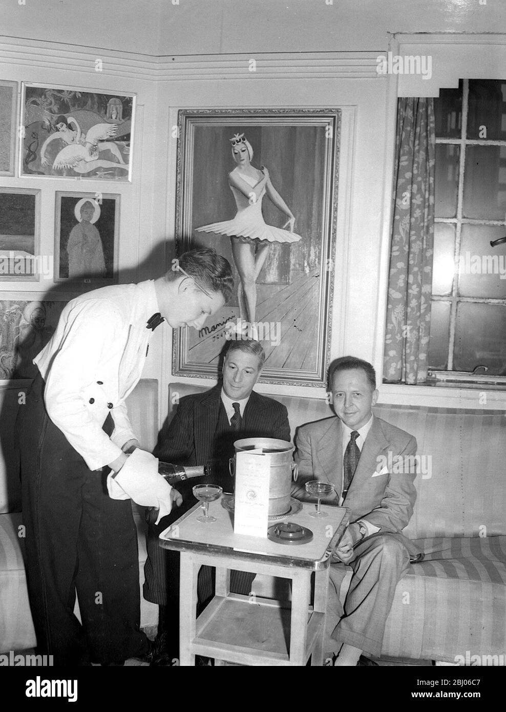 The interior of the Gargoyle Club in Dean Street, Soho. Wine waiter ...