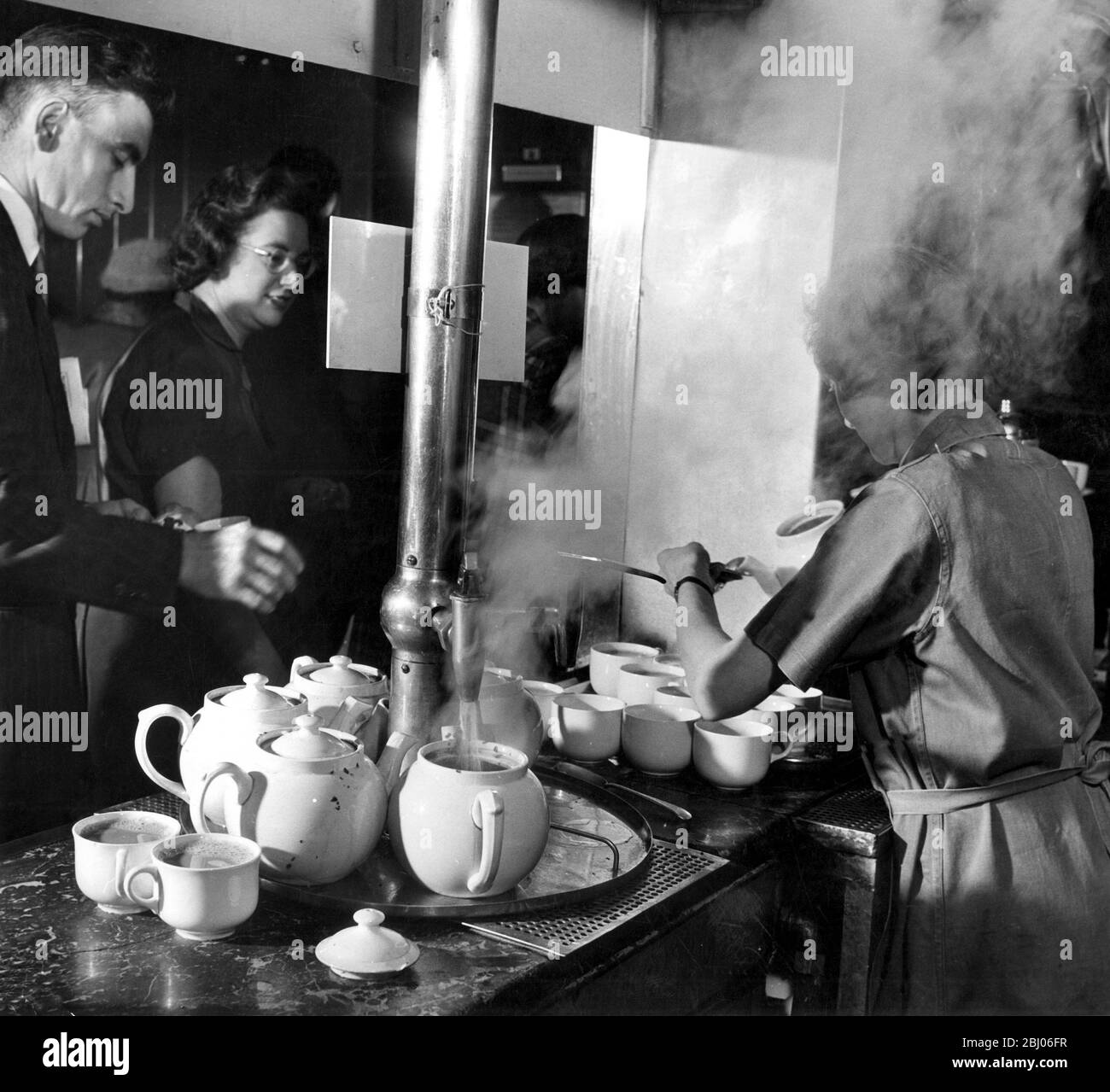 Getting a drink of water Black and White Stock Photos & Images - Alamy