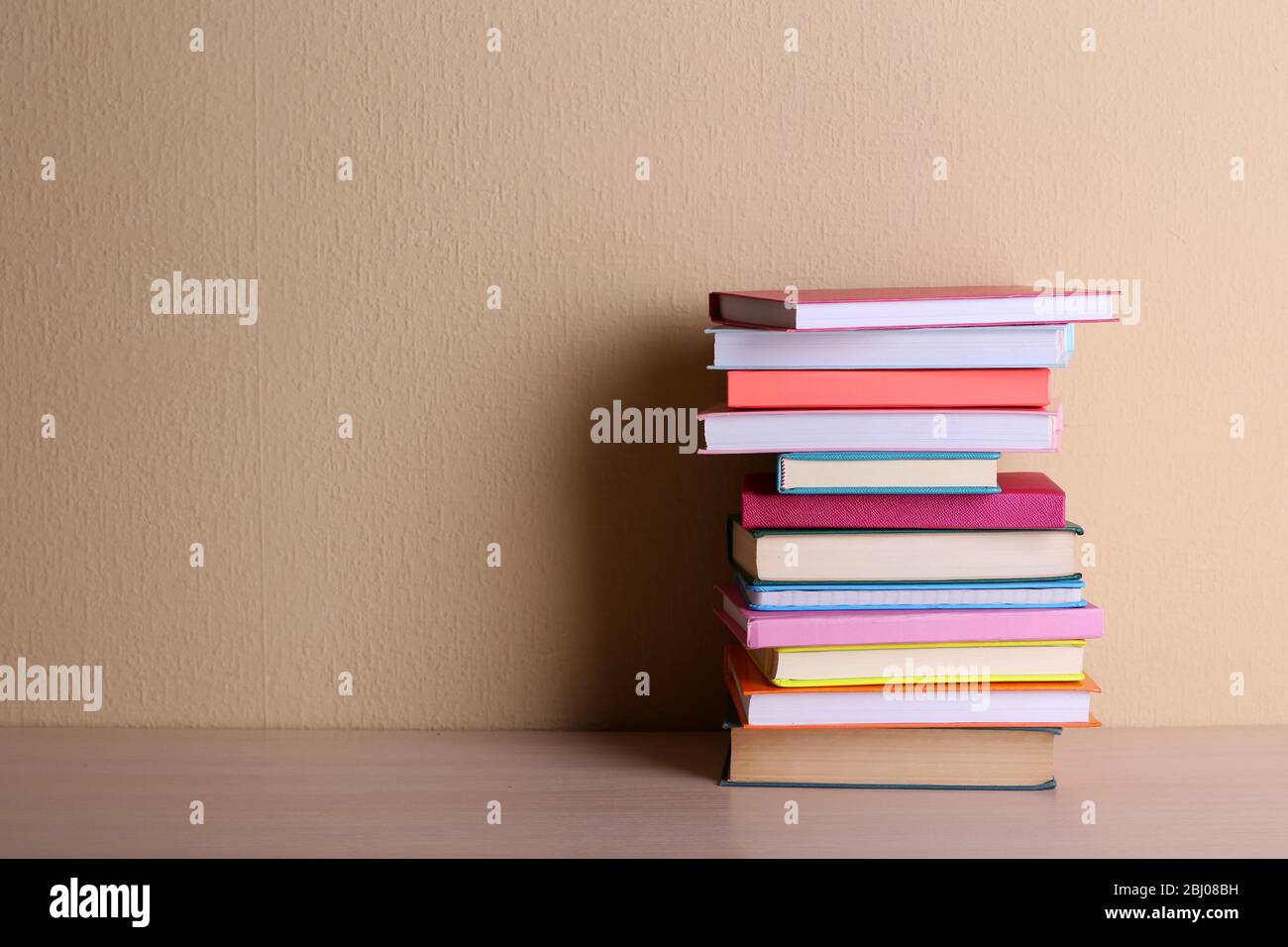 Stack of books on shelf Stock Photo - Alamy