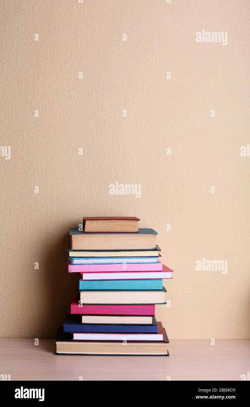 Stack of books on shelf Stock Photo - Alamy