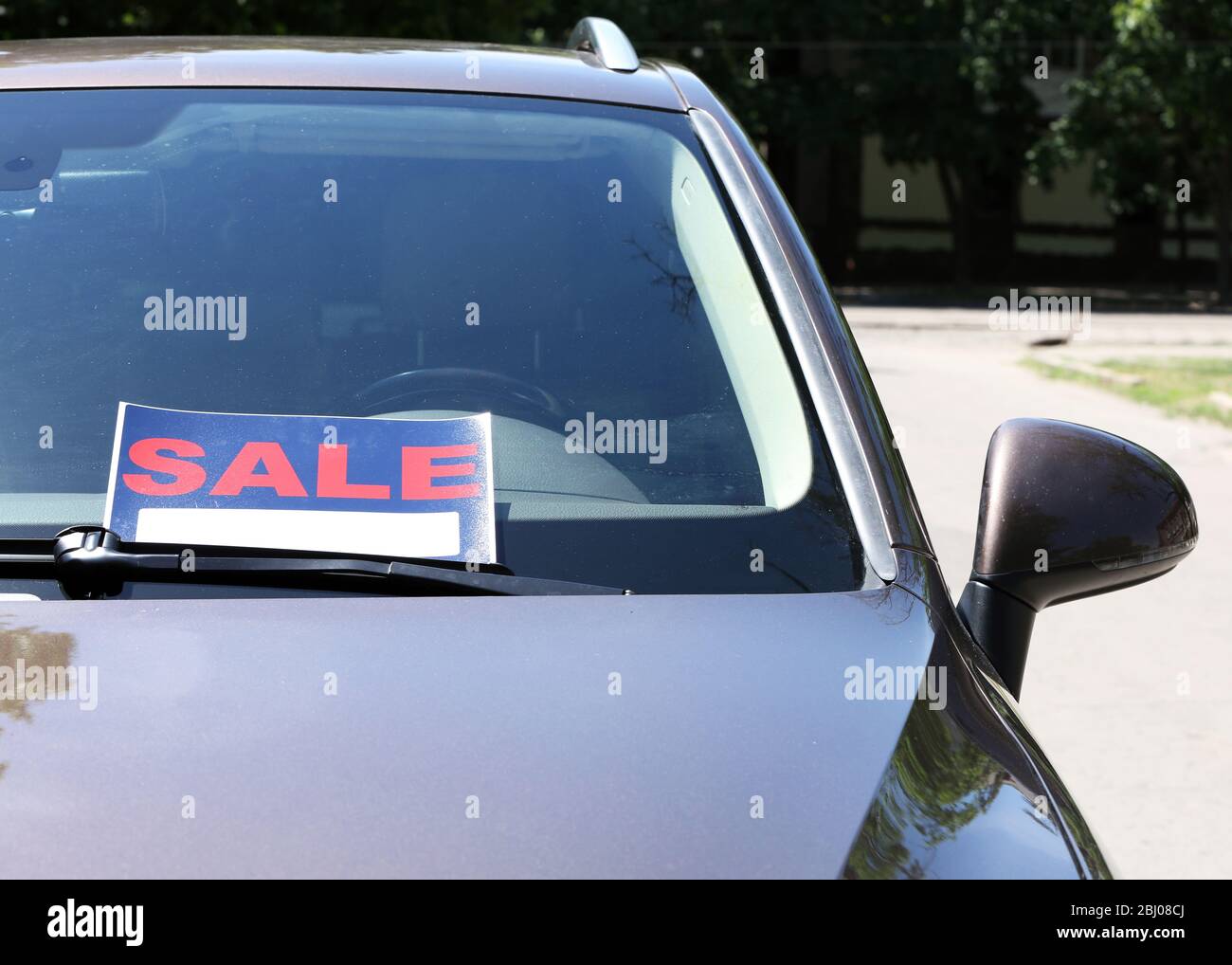 For sale sign on windshield of car Stock Photo - Alamy