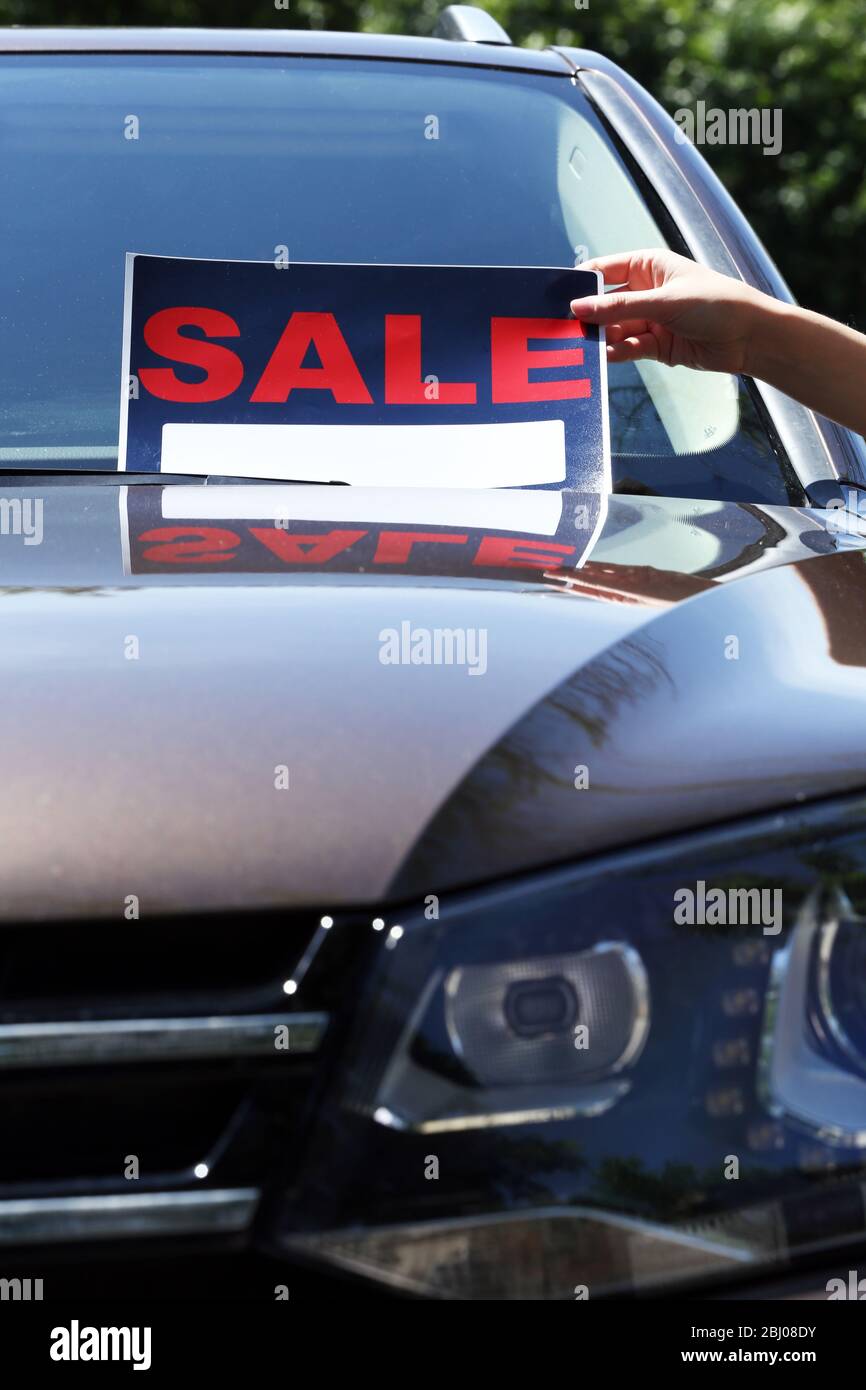 For sale sign on windshield of car Stock Photo - Alamy