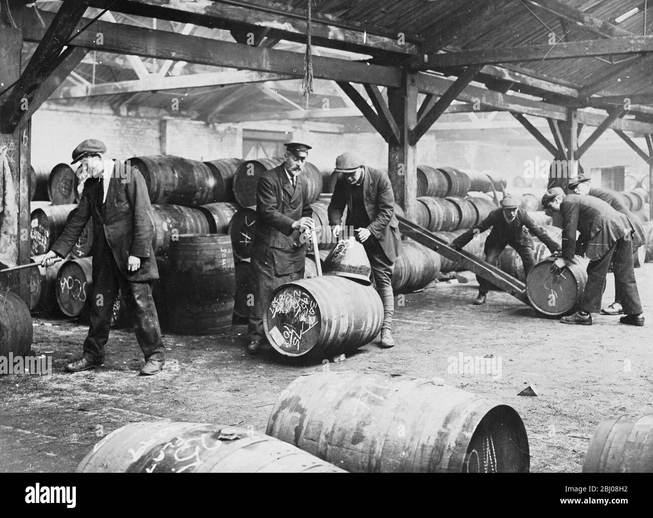 Customs workers at a bonded warehouse in London, England. undated Stock ...