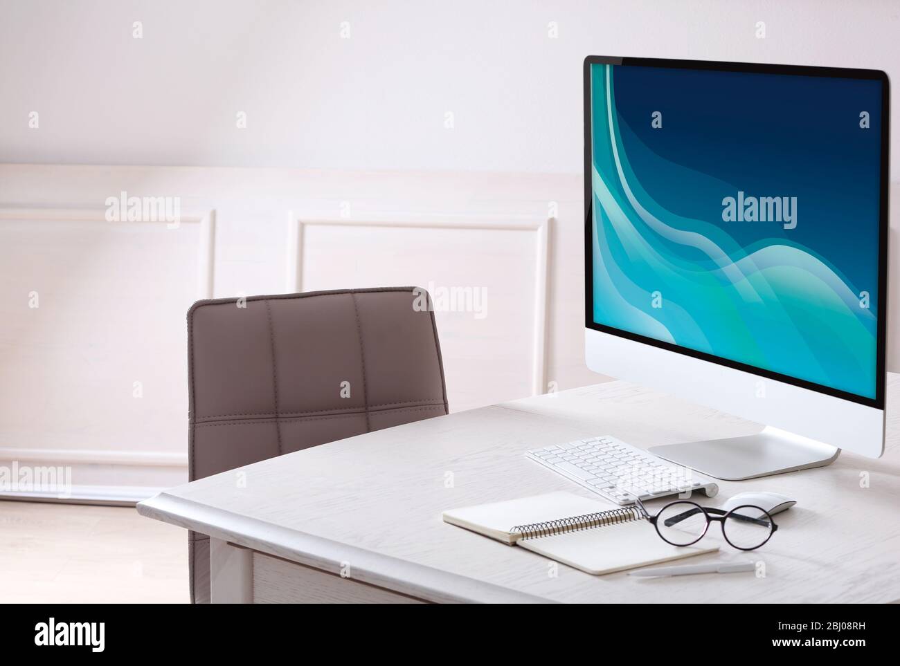 Workplace with computer in room Stock Photo - Alamy