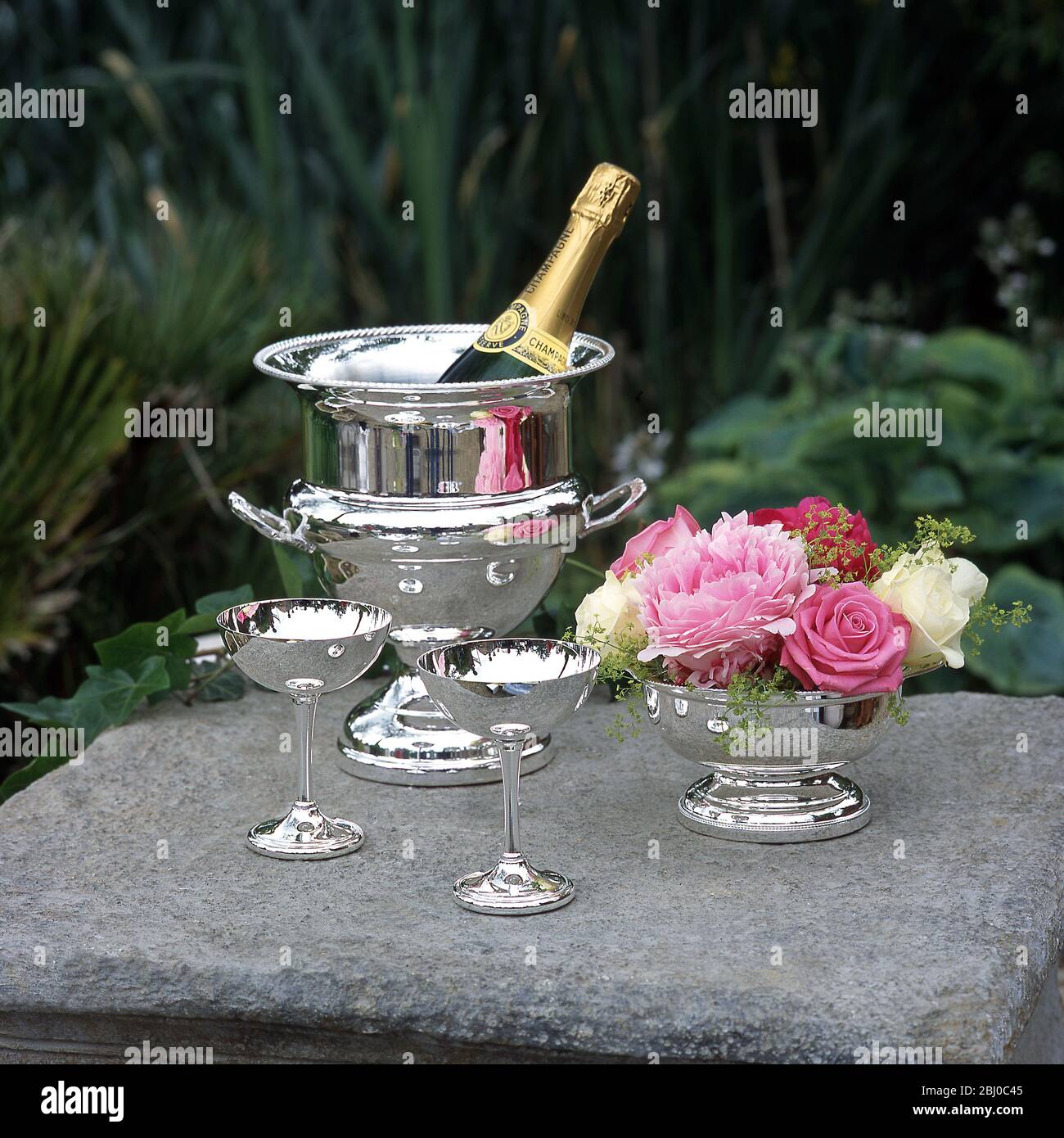 Champagne bucket and Wedding gifts. Modern English silverware Stock ...