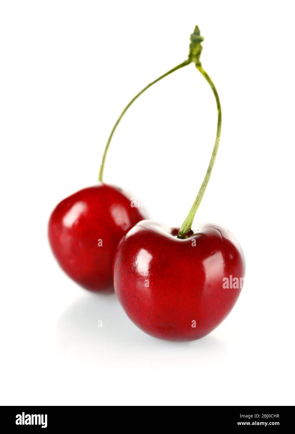 Fresh cherry isolated on white Stock Photo - Alamy