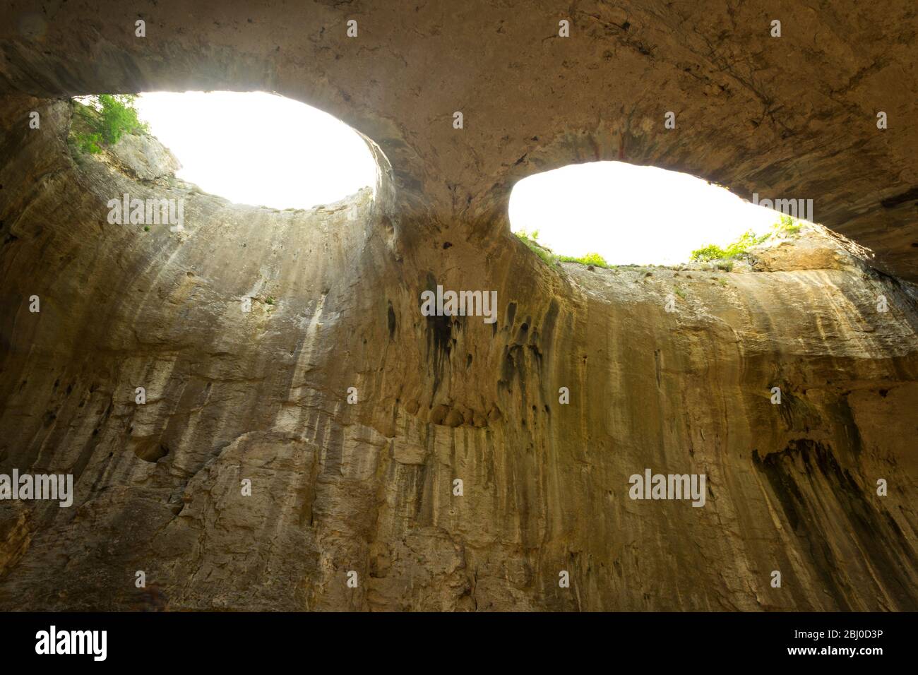 Prohodna cave is also known as God's eyes near Karlukovo village ...
