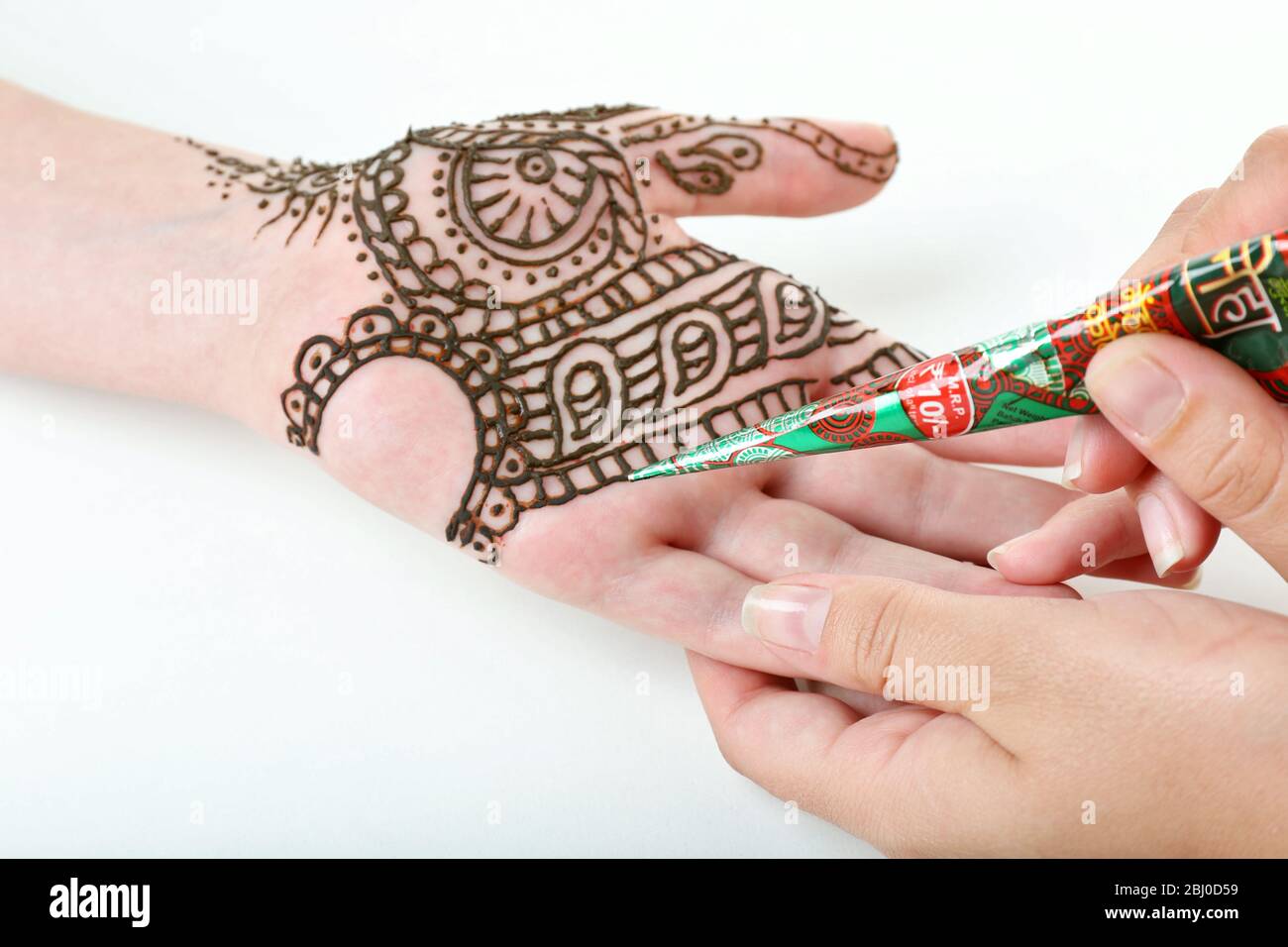 Image of henna applied on female hand isolated on white Stock Photo - Alamy