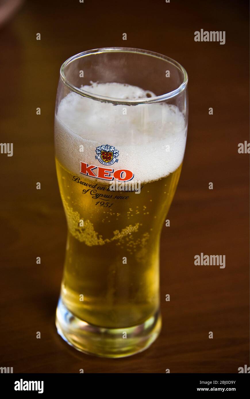 Glass of Keo beer in bar in southern Cyprus Stock Photo - Alamy