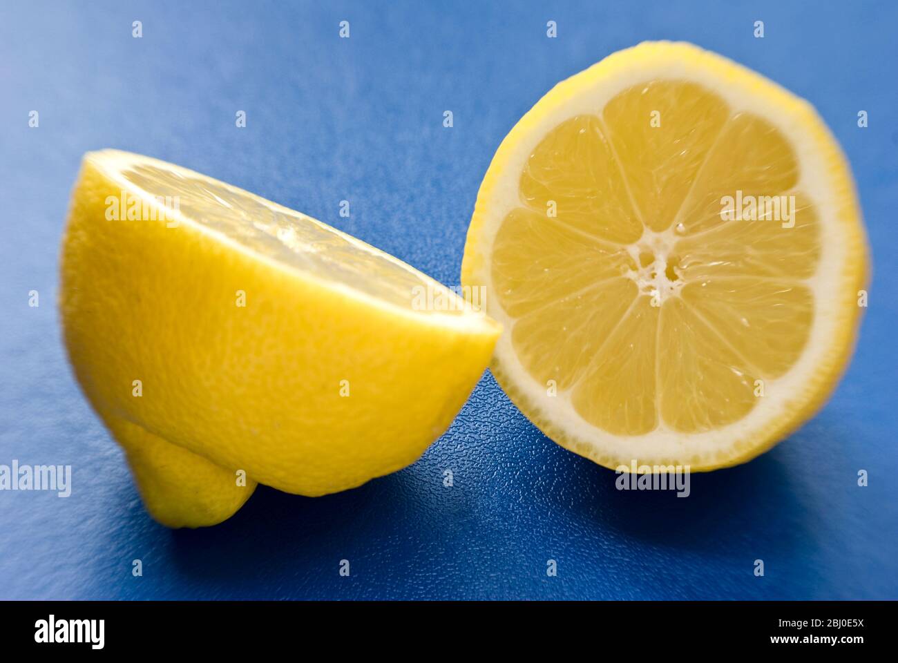 Yellow halved lemon on hi-res stock photography and images - Alamy