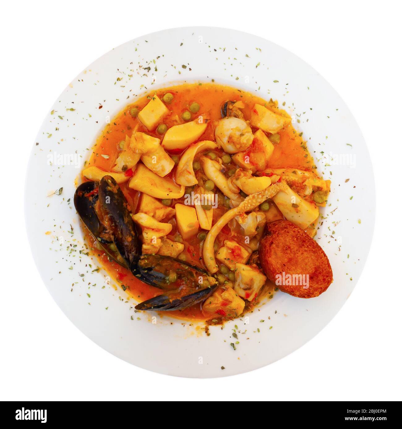 Fried cuttlefish in spicy sauce. Isolated over white background Stock ...