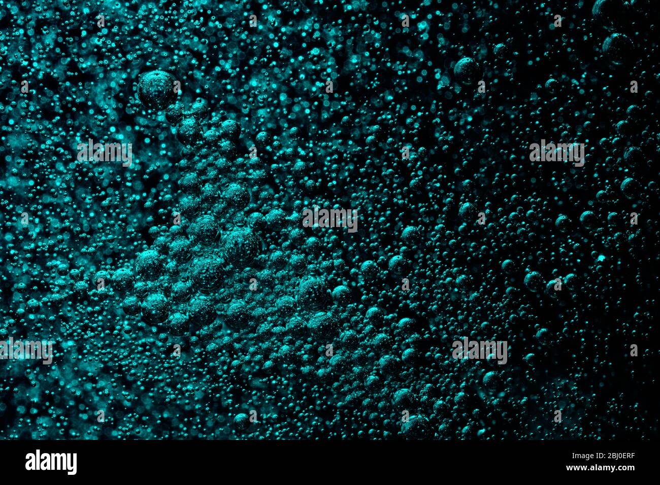 Bright micro bubbles in blue-green colored space Stock Photo - Alamy