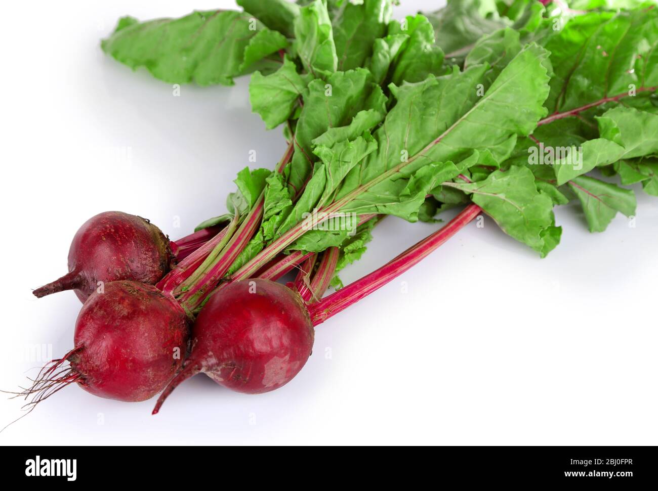Young beets isolated on white Stock Photo - Alamy