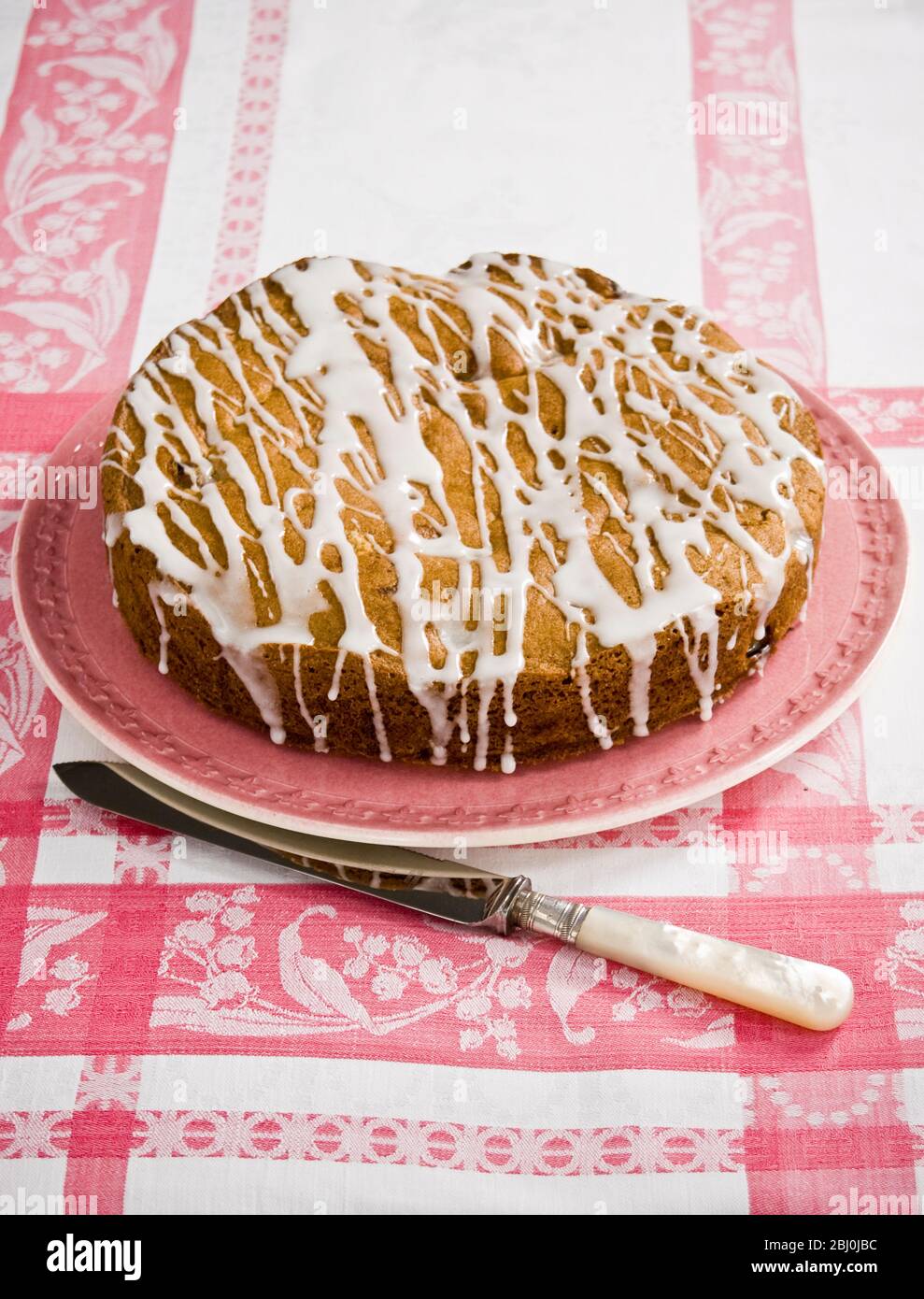 Gooseberry cake with drizzled water icing Stock Photo - Alamy