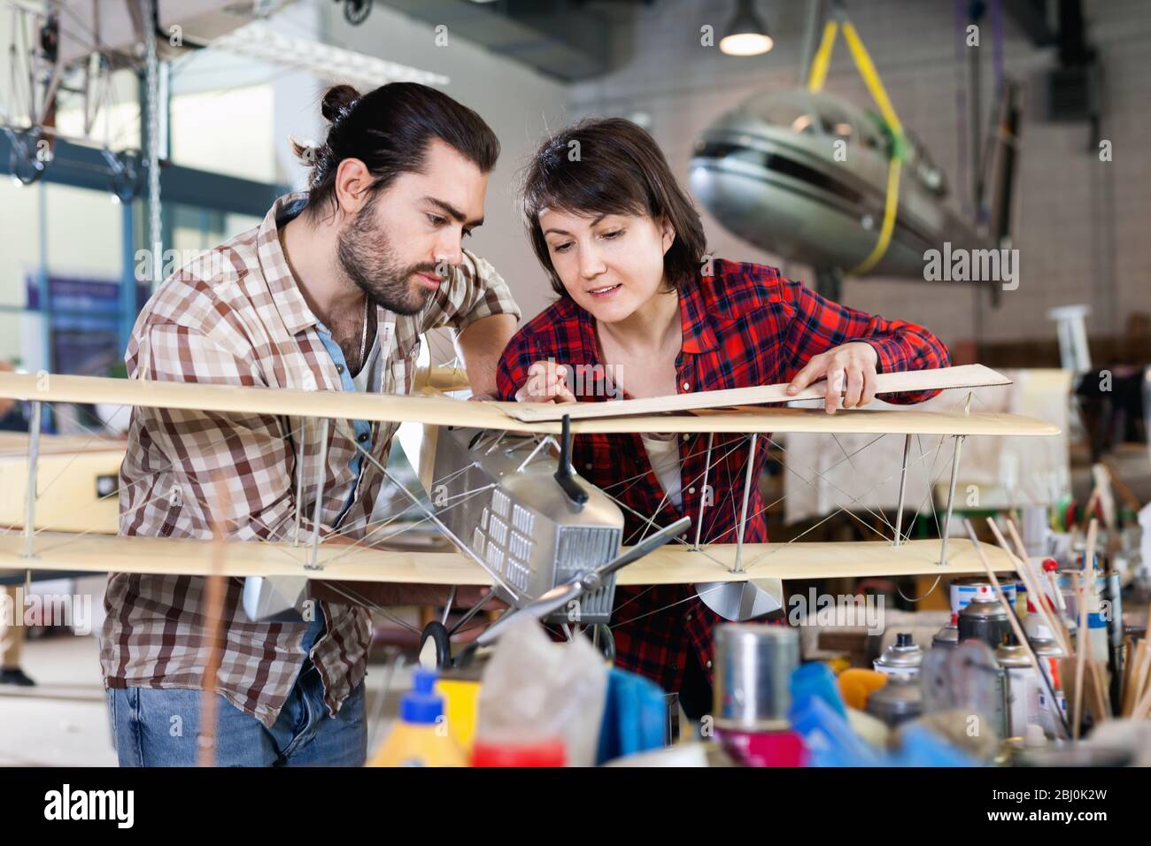 Positive glad pleasant friendly couple enjoying their hobbies ...