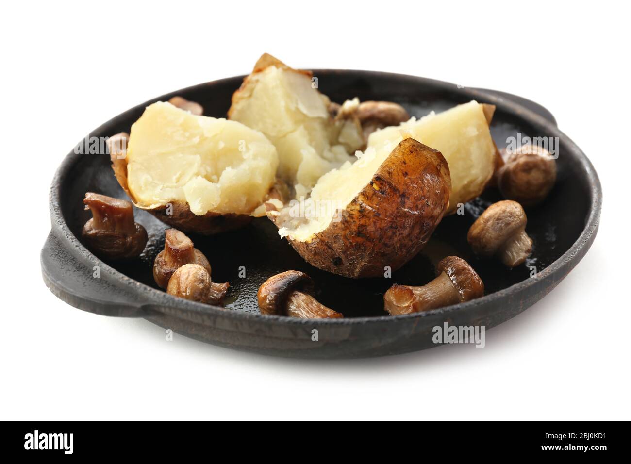 Roasted mushrooms on pan Cut Out Stock Images & Pictures - Alamy