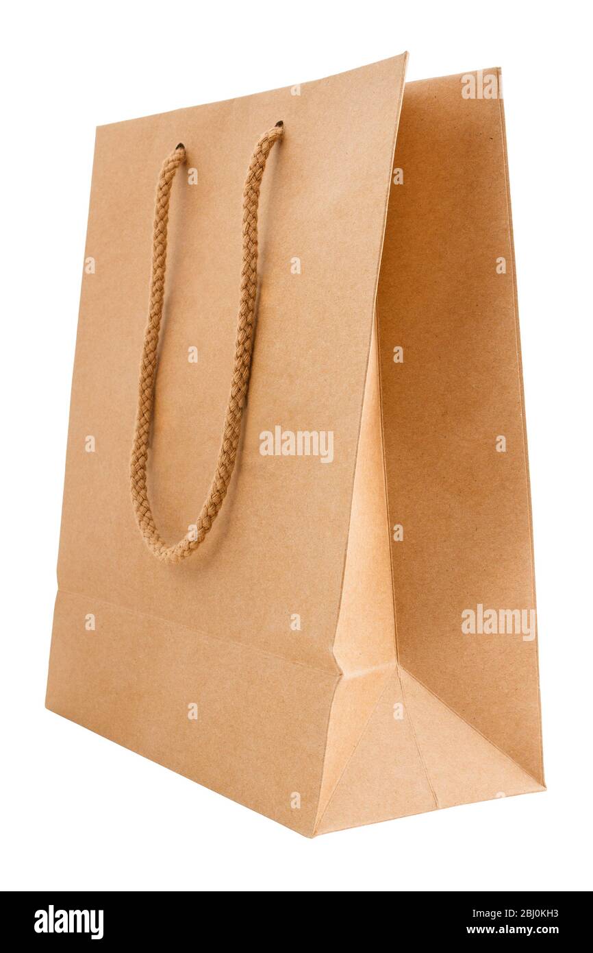 Side view of kraft paper bag on white background Stock Photo - Alamy