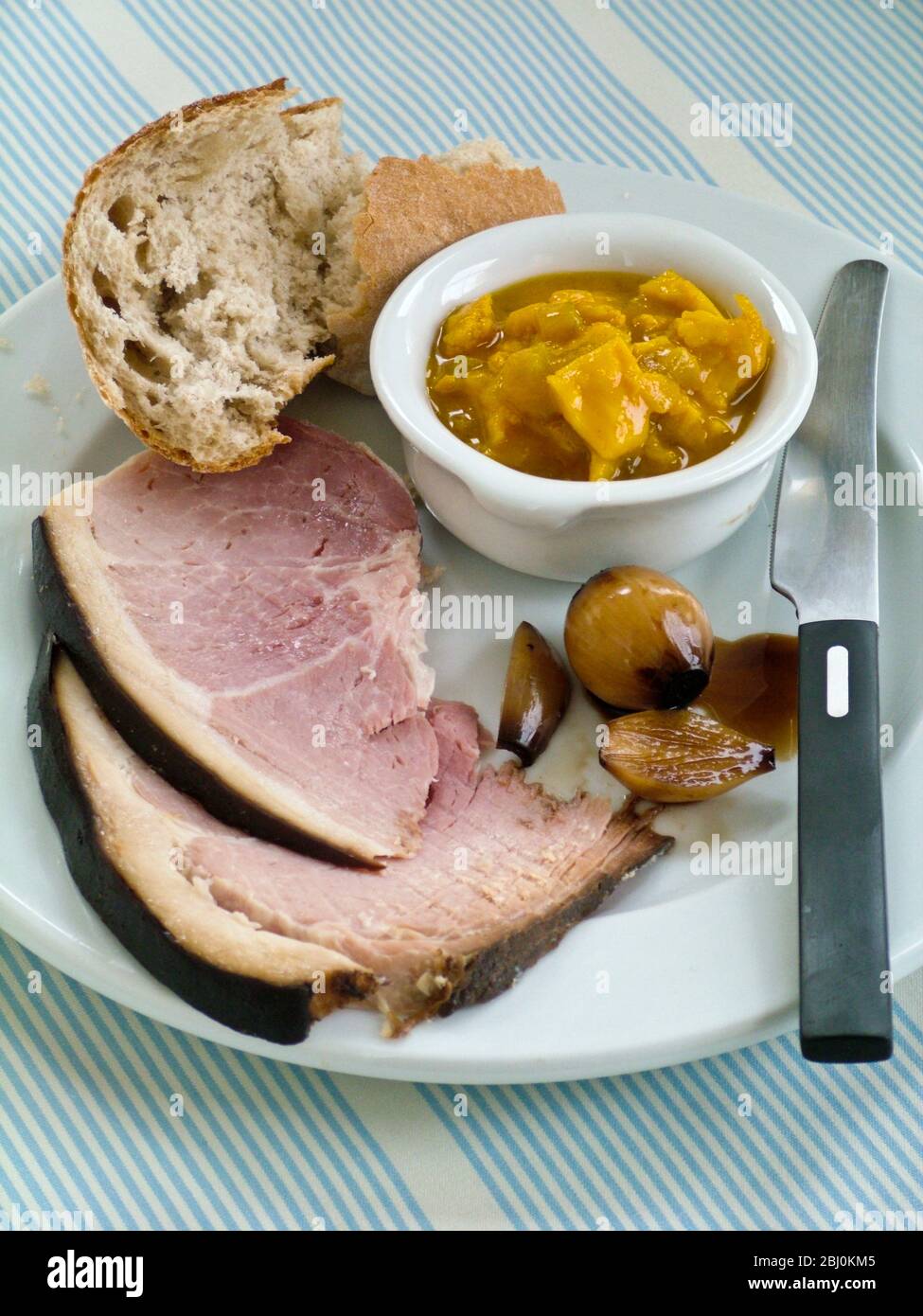 Smoked York ham with pickles and crusty bread Stock Photo - Alamy