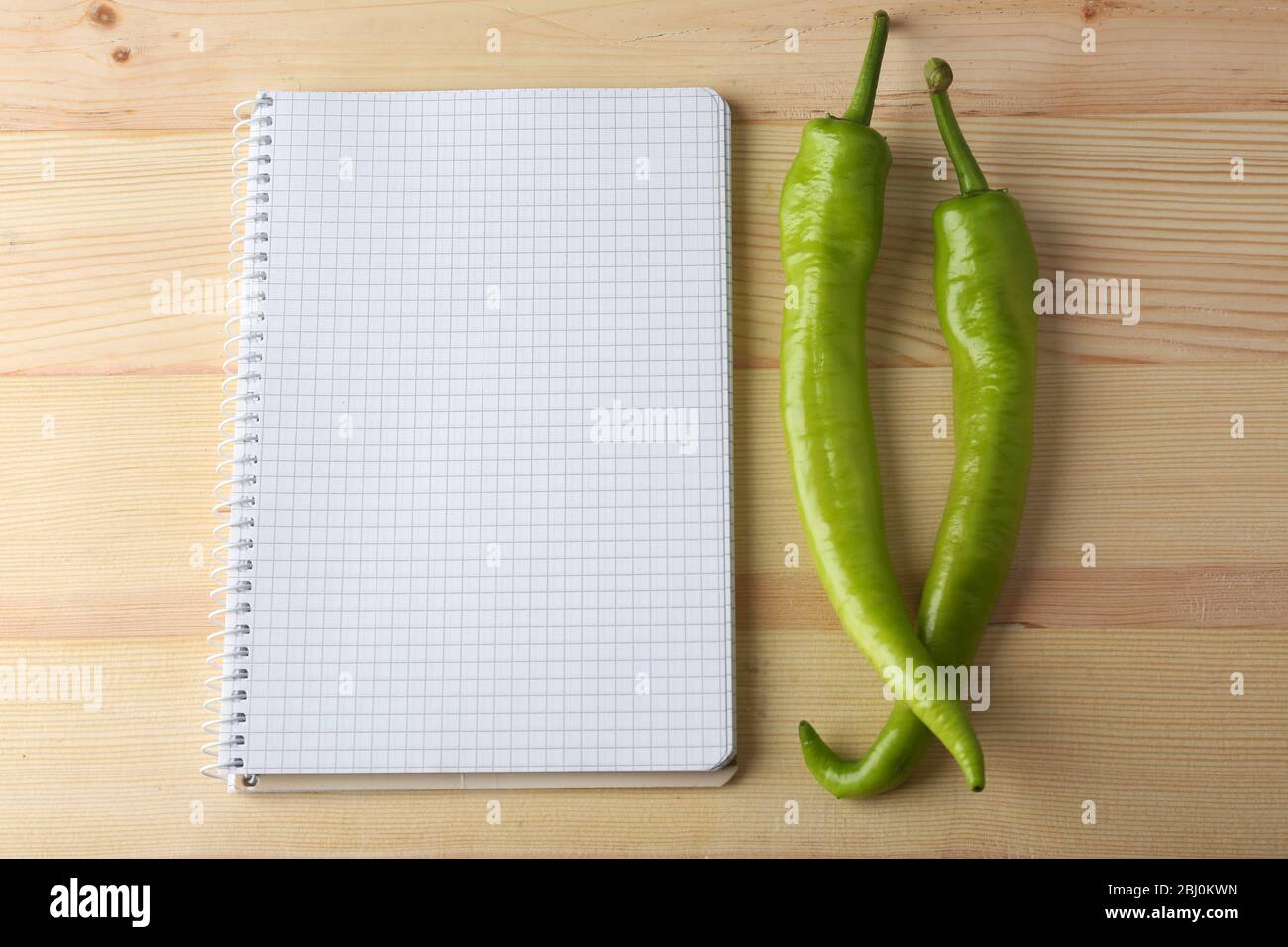 Open recipe book on wooden background Stock Photo - Alamy