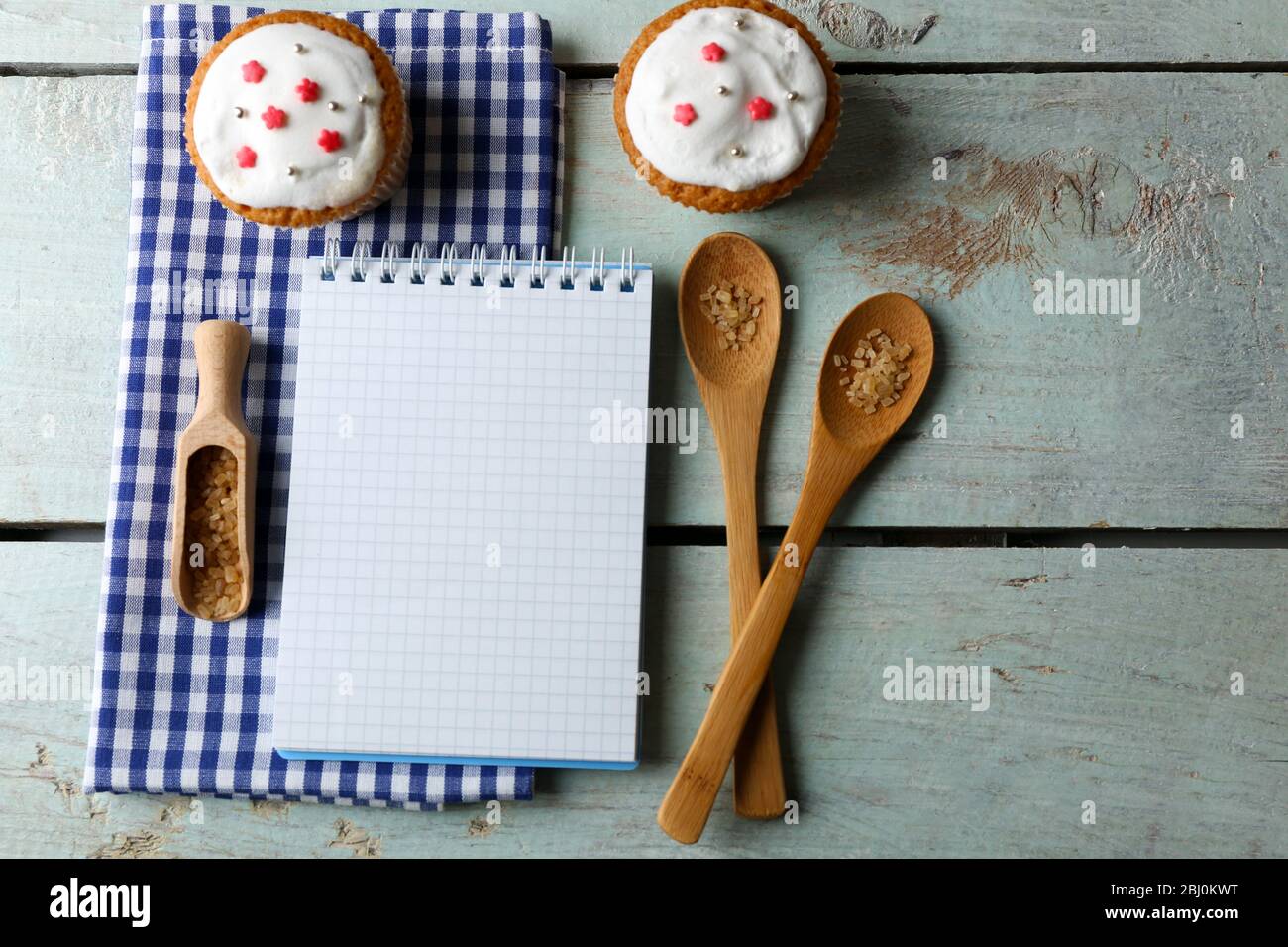 Open recipe book on wooden background Stock Photo - Alamy