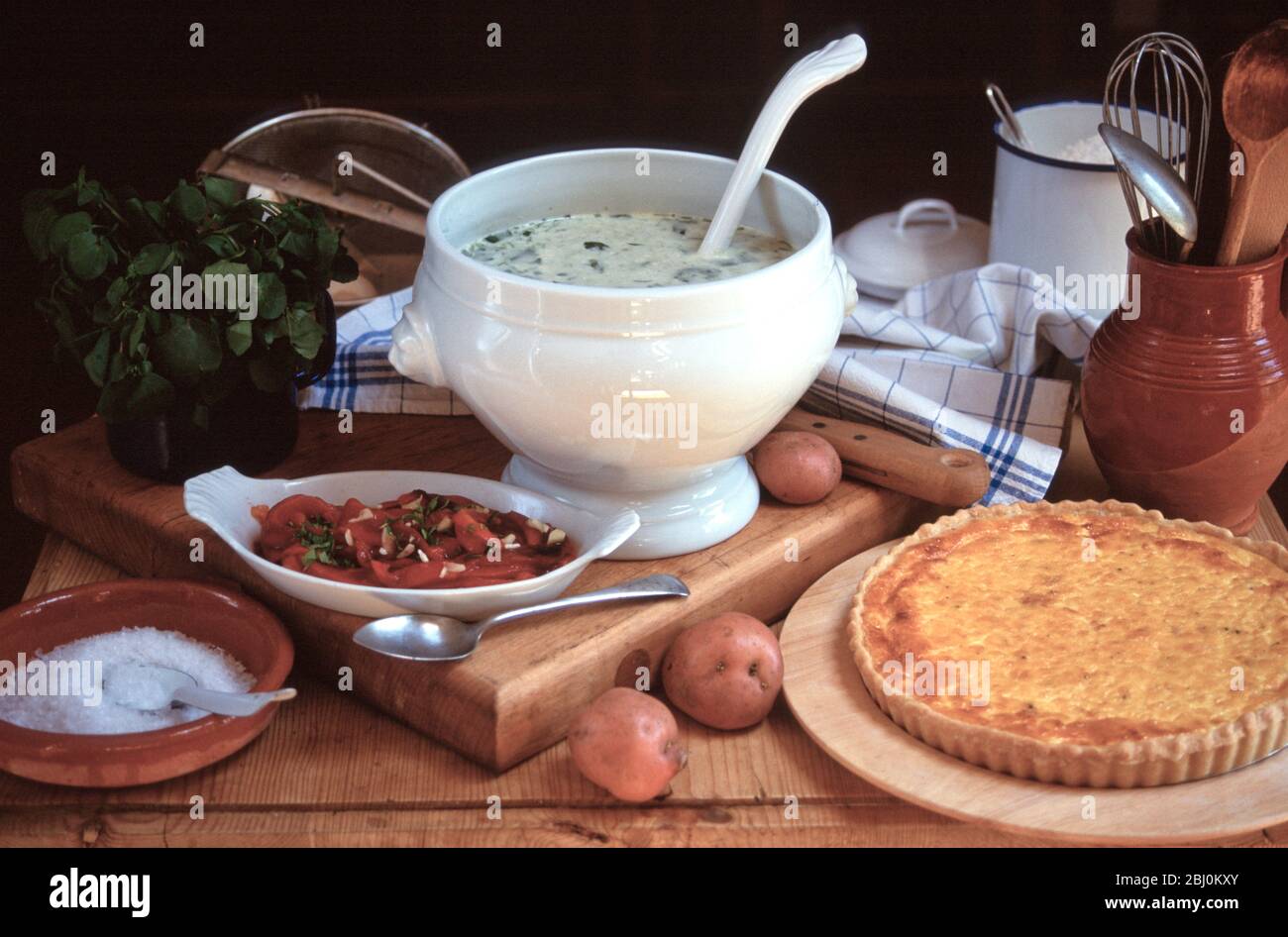 Classic French dishes in rustic kitchen setting Stock Photo - Alamy