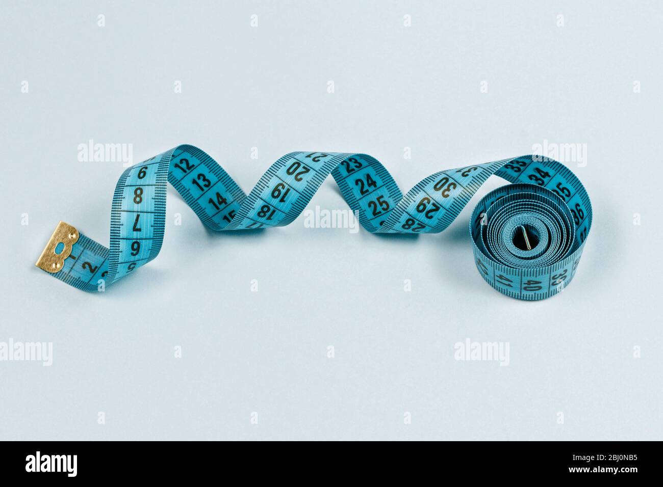 Tailor measuring tape Stock Photo - Alamy