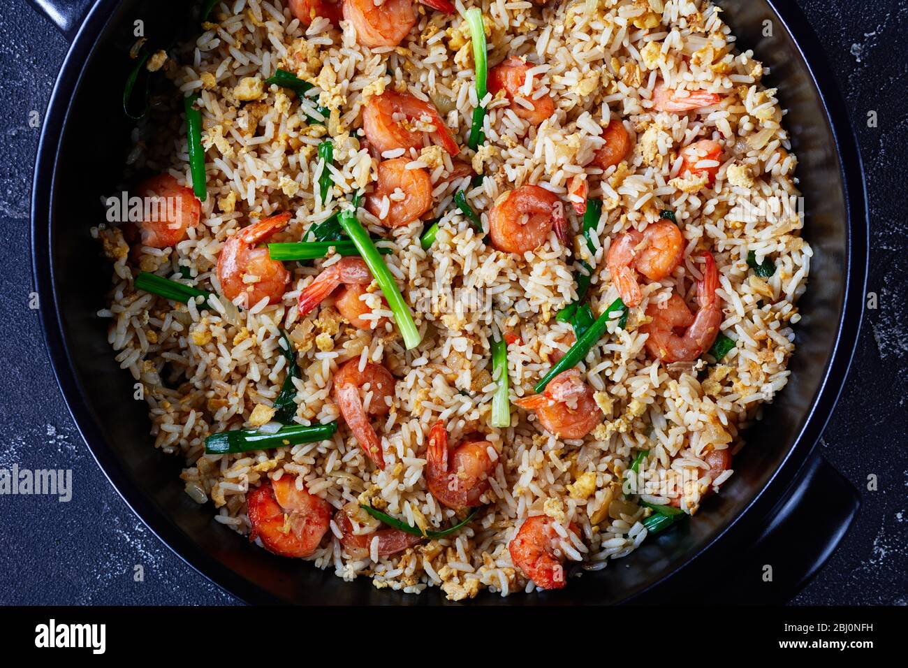 Asian stir fry rice khao pad kung with shrimps Stock Photo - Alamy