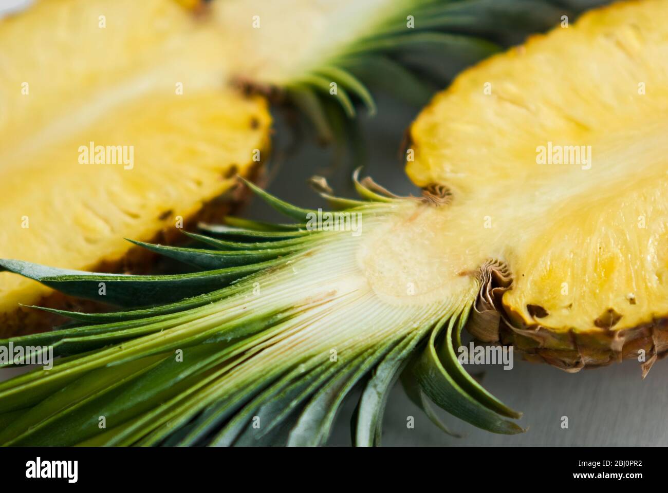 Halves fresh pineapple on hi-res stock photography and images - Alamy