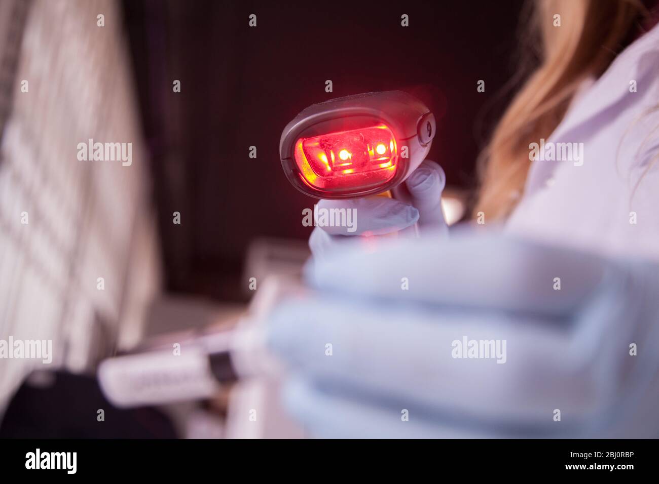 Scanning of medical samples in a testing laboratory Stock Photo - Alamy