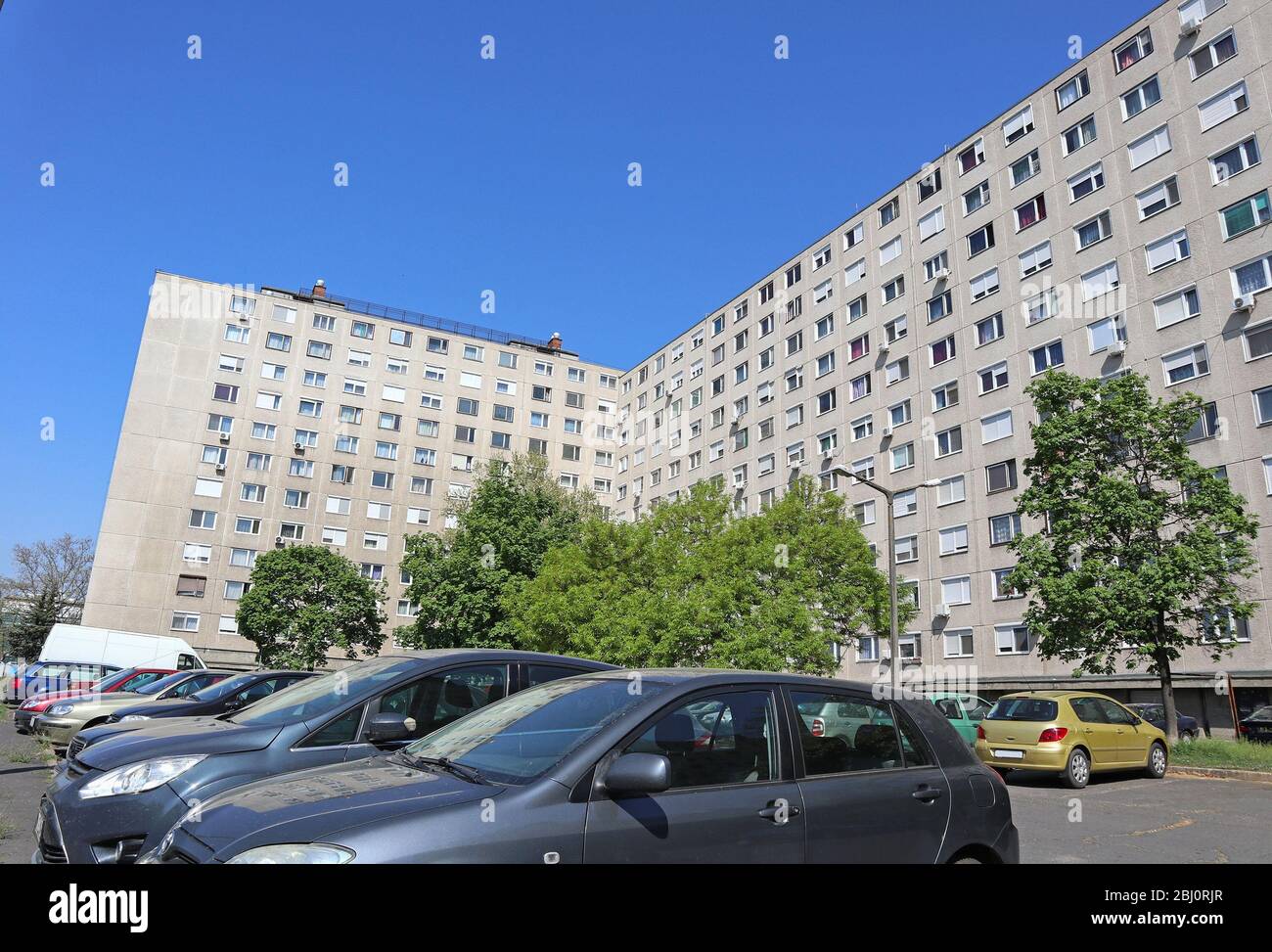 Old apartment buildings in the city Stock Photo - Alamy
