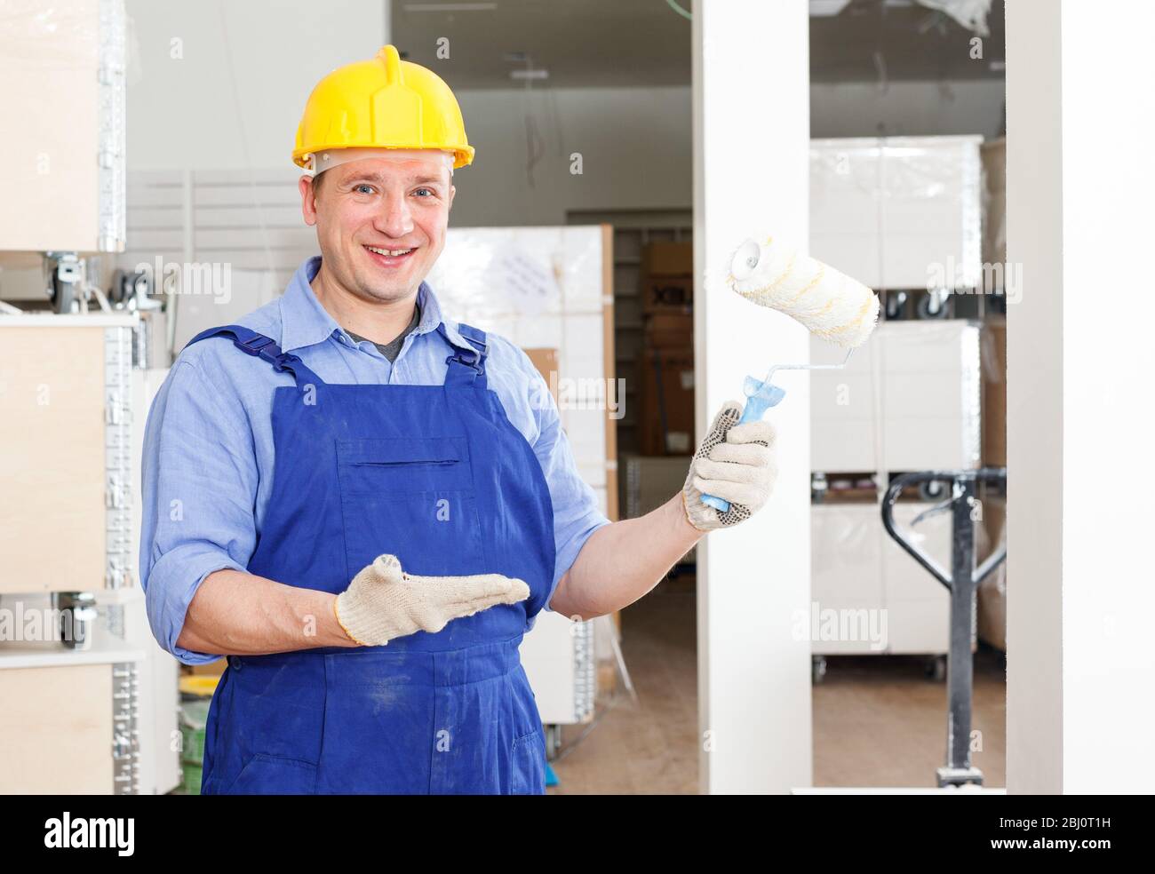 Confident builder handyman ready for renovation work indoors Stock ...