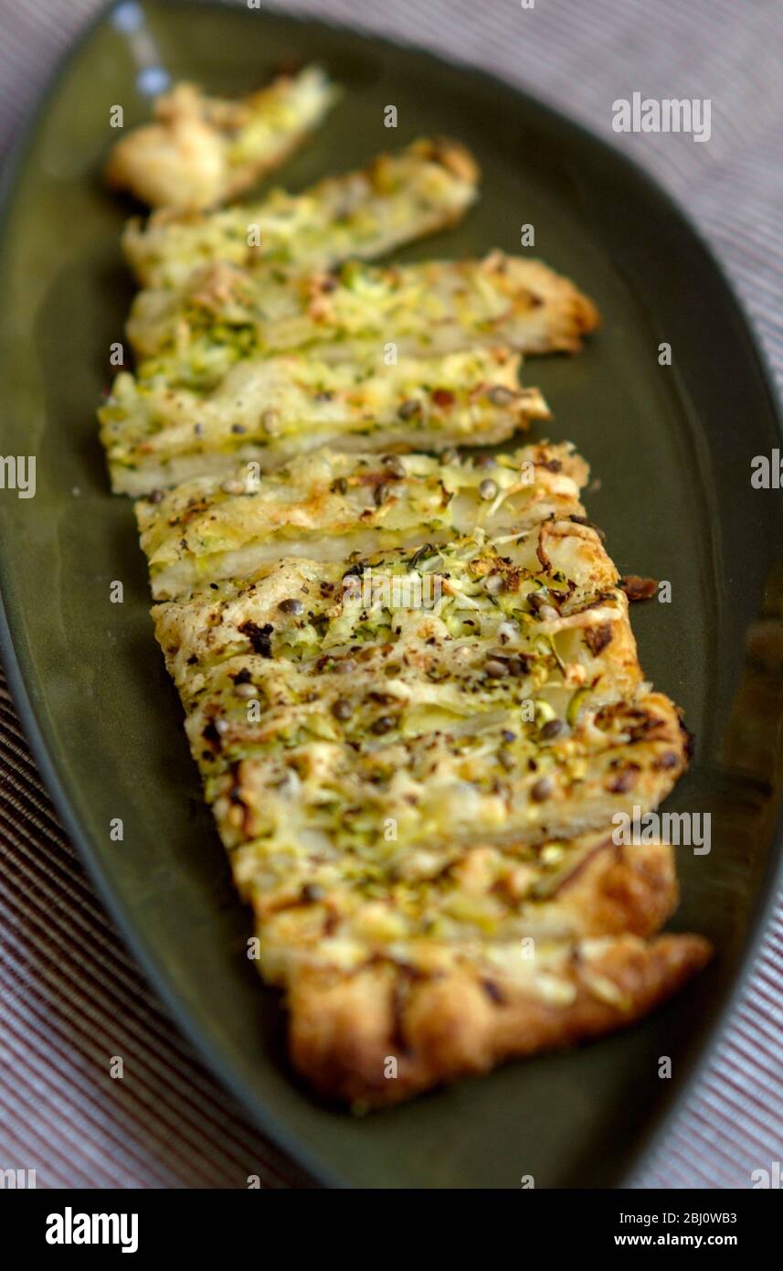 Freshly baked cheese straws made with grated courgette and grated ...