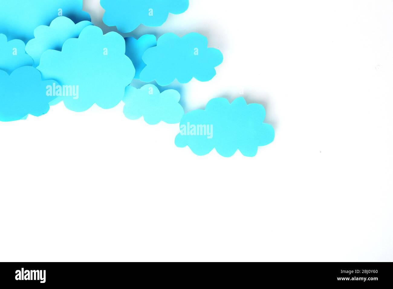 Blue paper clouds, isolated on white. Cloud computing concept Stock ...