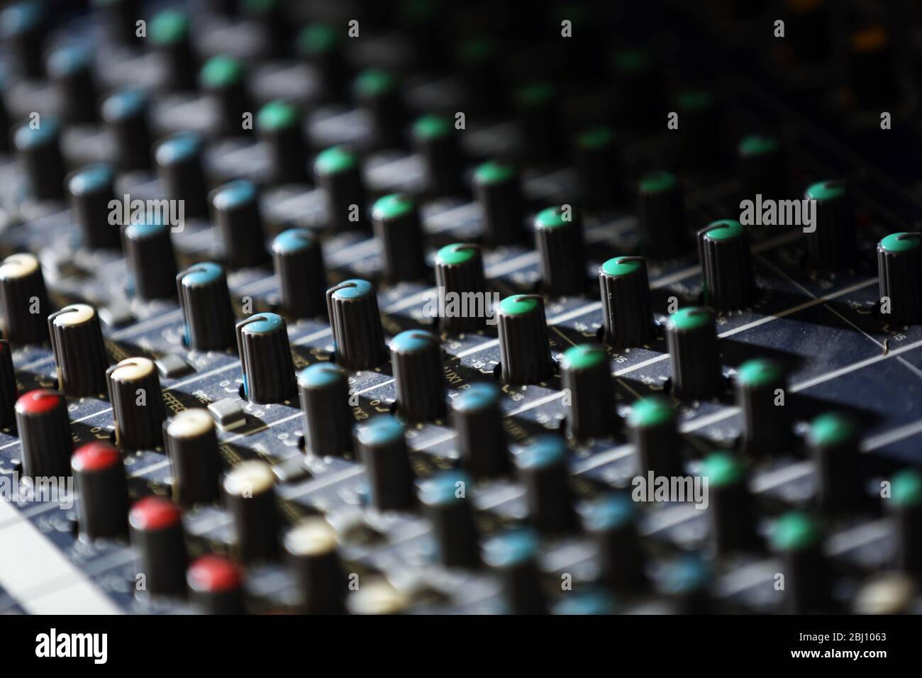 Audio mixing console closeup Stock Photo - Alamy