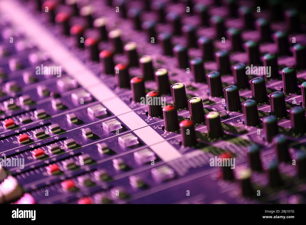 Audio mixing console closeup Stock Photo - Alamy