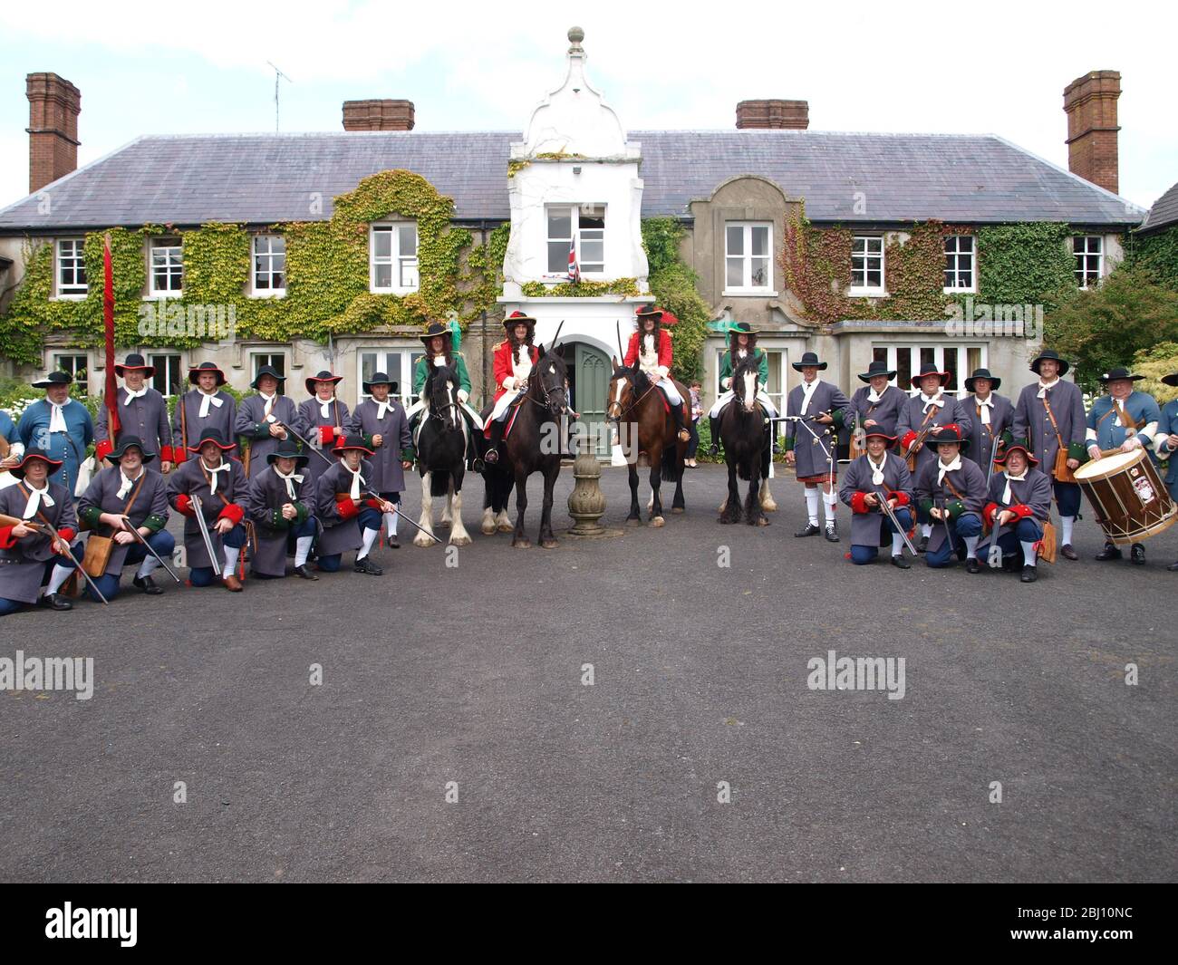 The actors from the sham fight pose in front of Scarva House at the ...