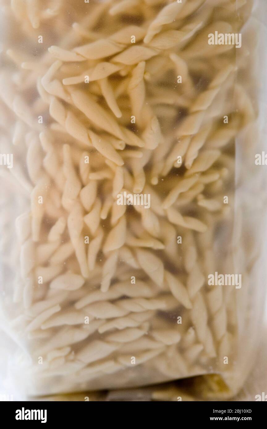 Closeup of trofie twisted pasta shapes in packet Stock Photo - Alamy