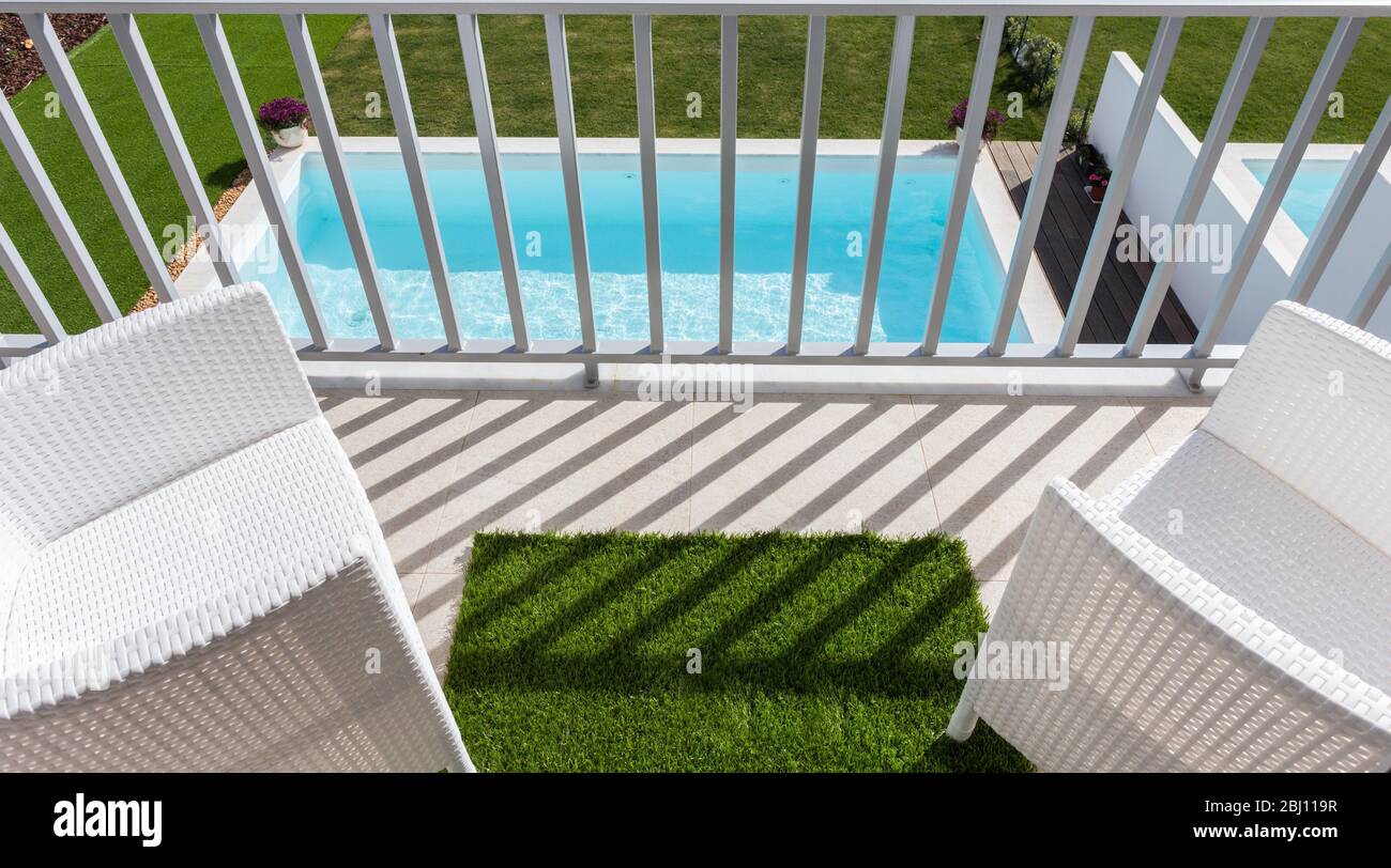 Balcony in resort, modern room with a view for the pool and a beautiful ...