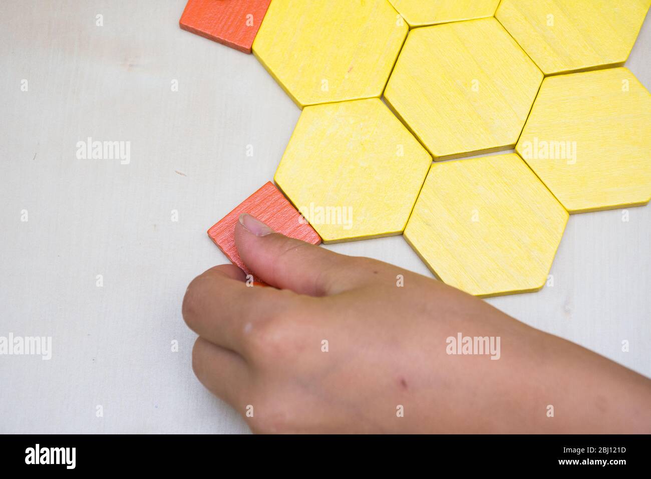 Tangram yellow and orange hexagon flower colored child geometric puzzle ...