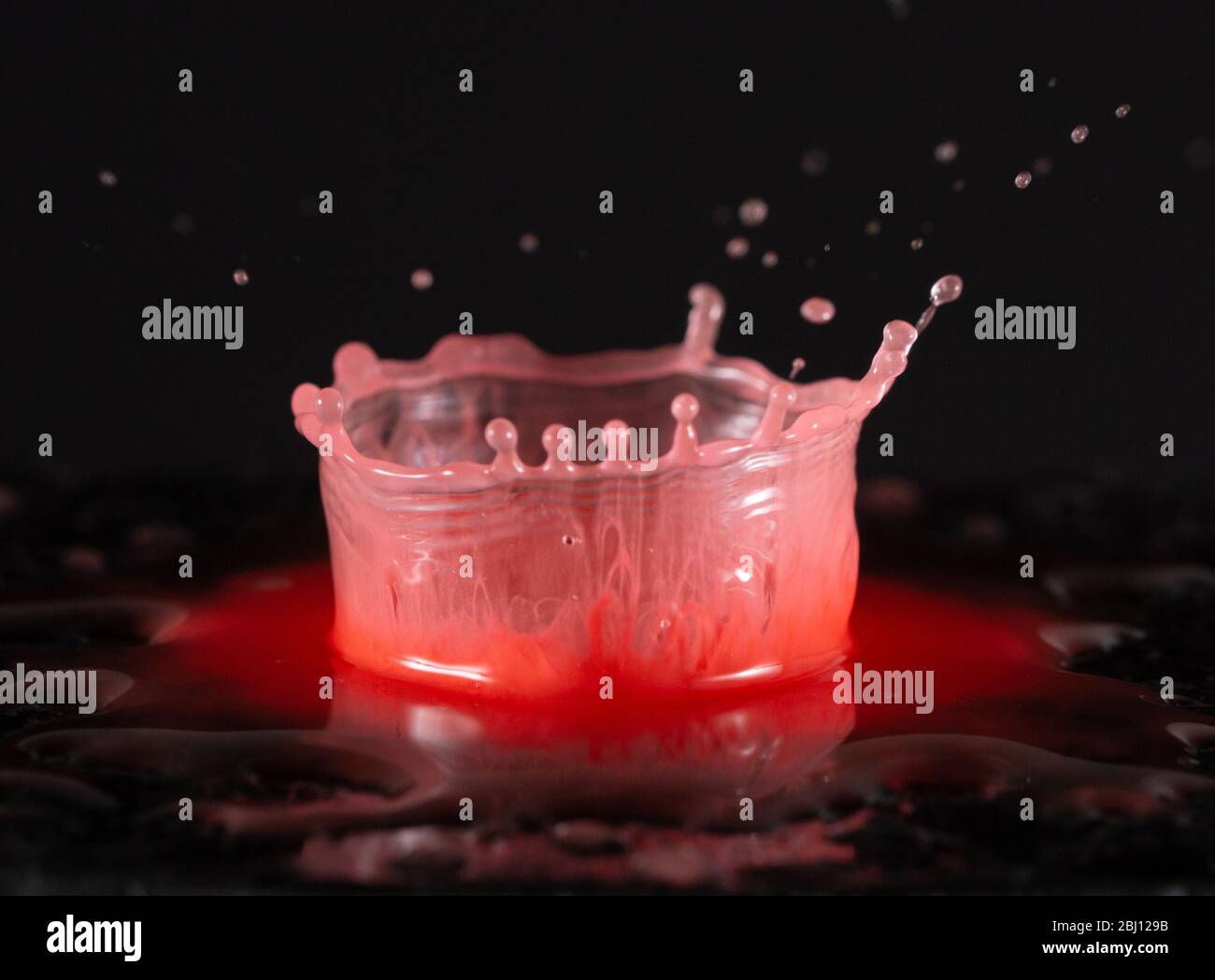 Dynamic wet ink splash hi-res stock photography and images - Alamy