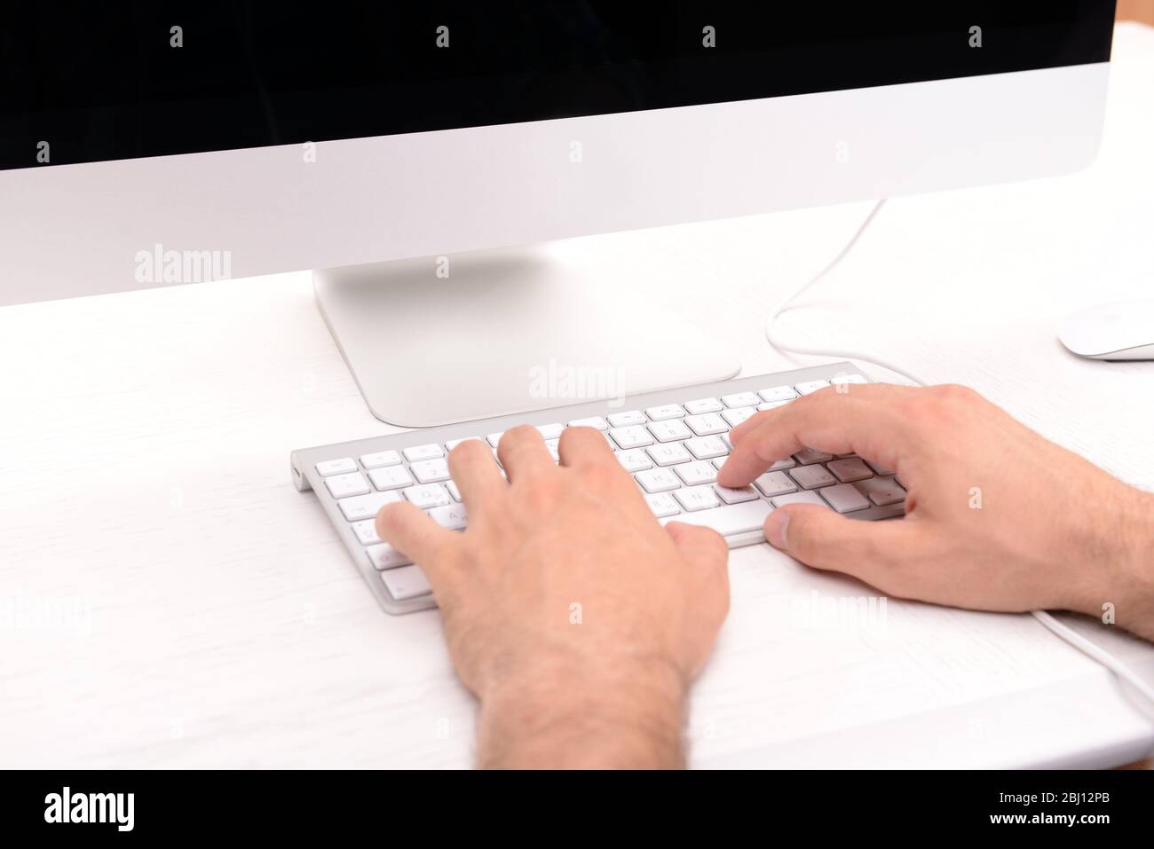 Male hand on computer keyboard close up Stock Photo - Alamy
