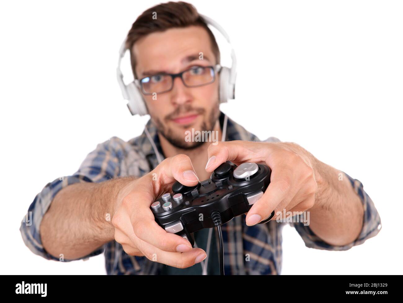 Young man playing video games isolated on white Stock Photo - Alamy