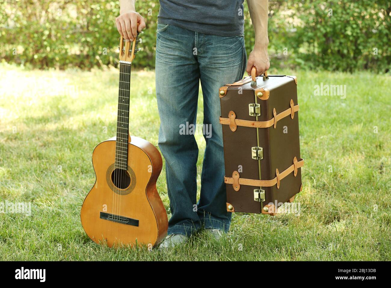 Suitcase and guitar hi-res stock photography and images - Alamy