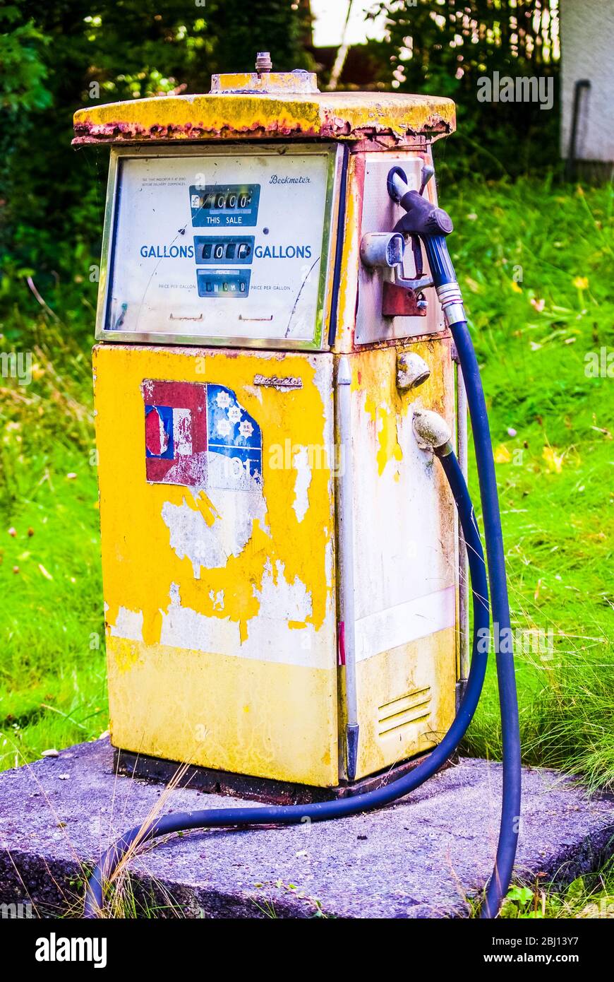 Rusted old gas pump in derelict garage UK Stock Photo - Alamy